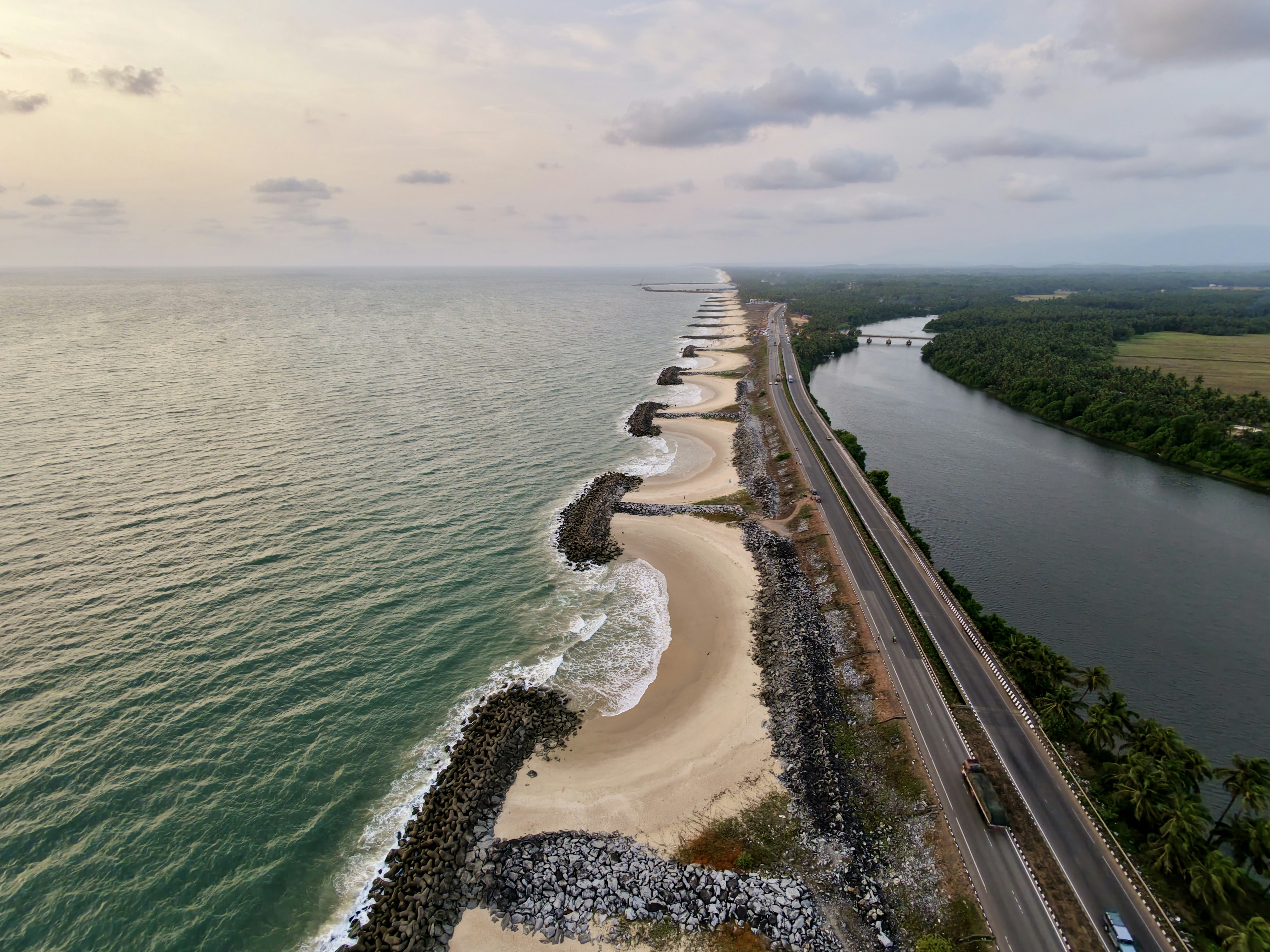 Coastal Causeway: A Parallel Slice of Sea, Sand, and Road