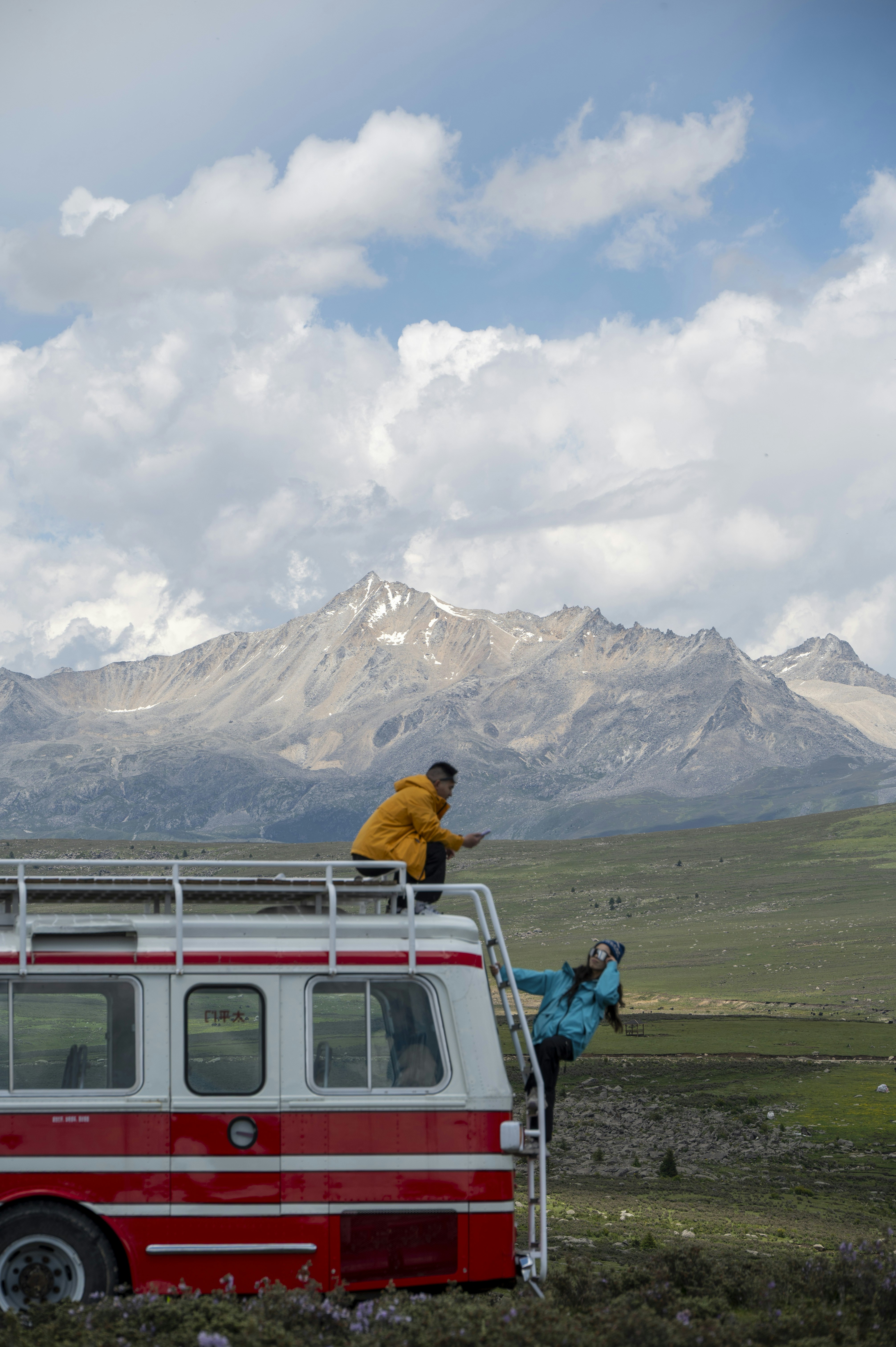 Horizon Ride: Two Explorers on a Remote Cliffside