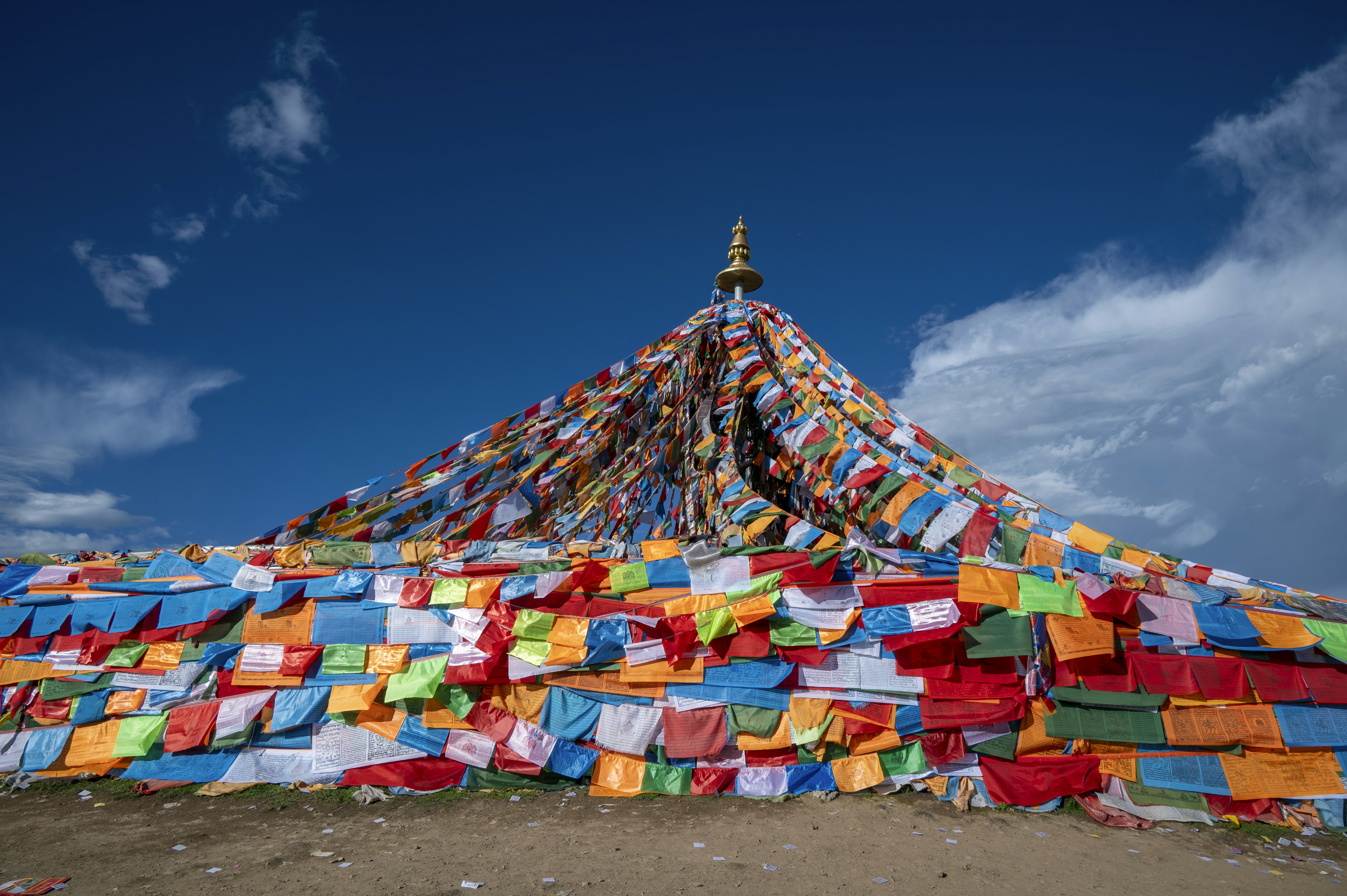 Prayer Flags on the Hill: A Burst of Color Under a Clear Tibetan Sky