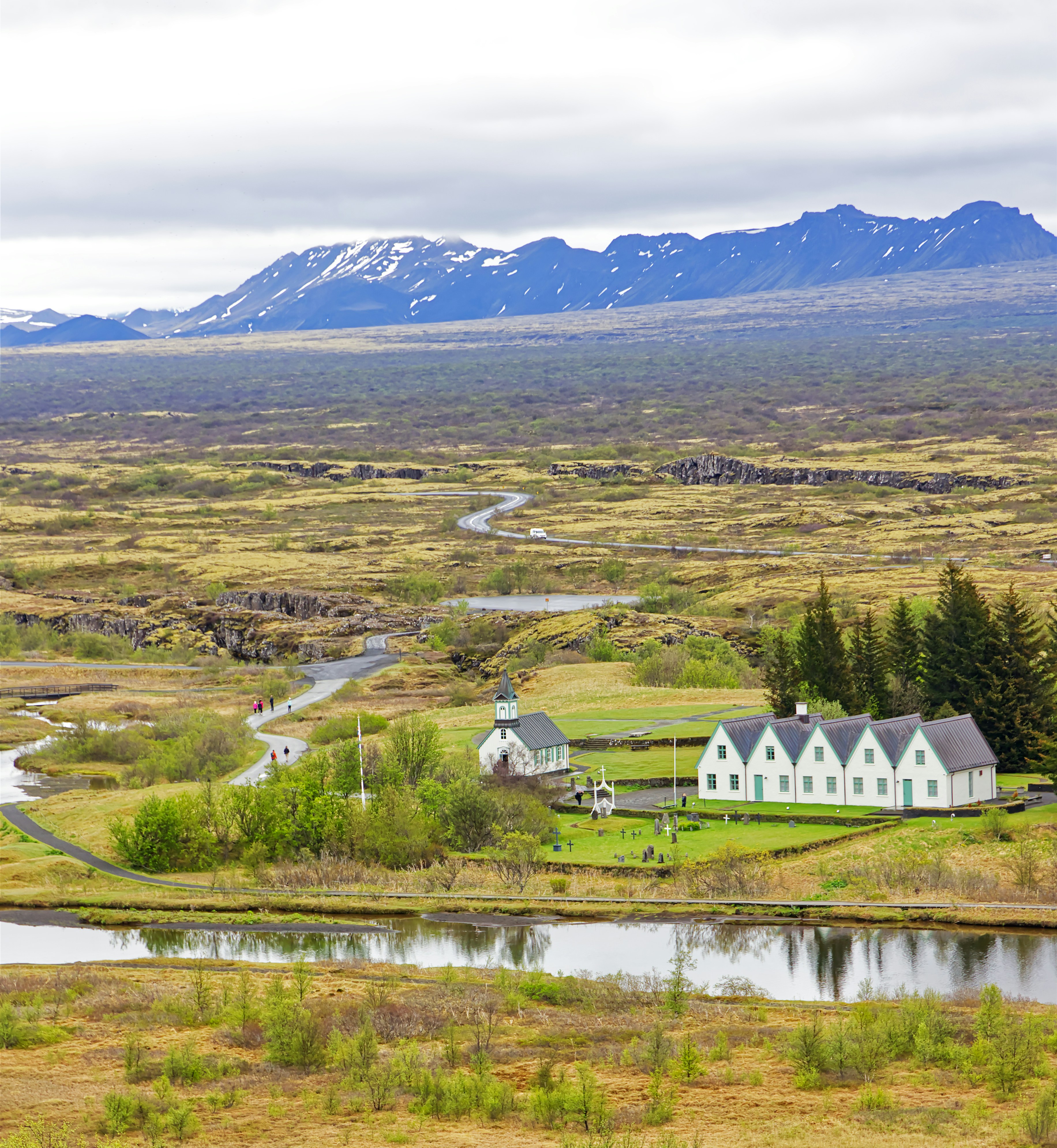 Pastoral Choir: A Quiet Village by the River Beneath Snow-Capped Peaks