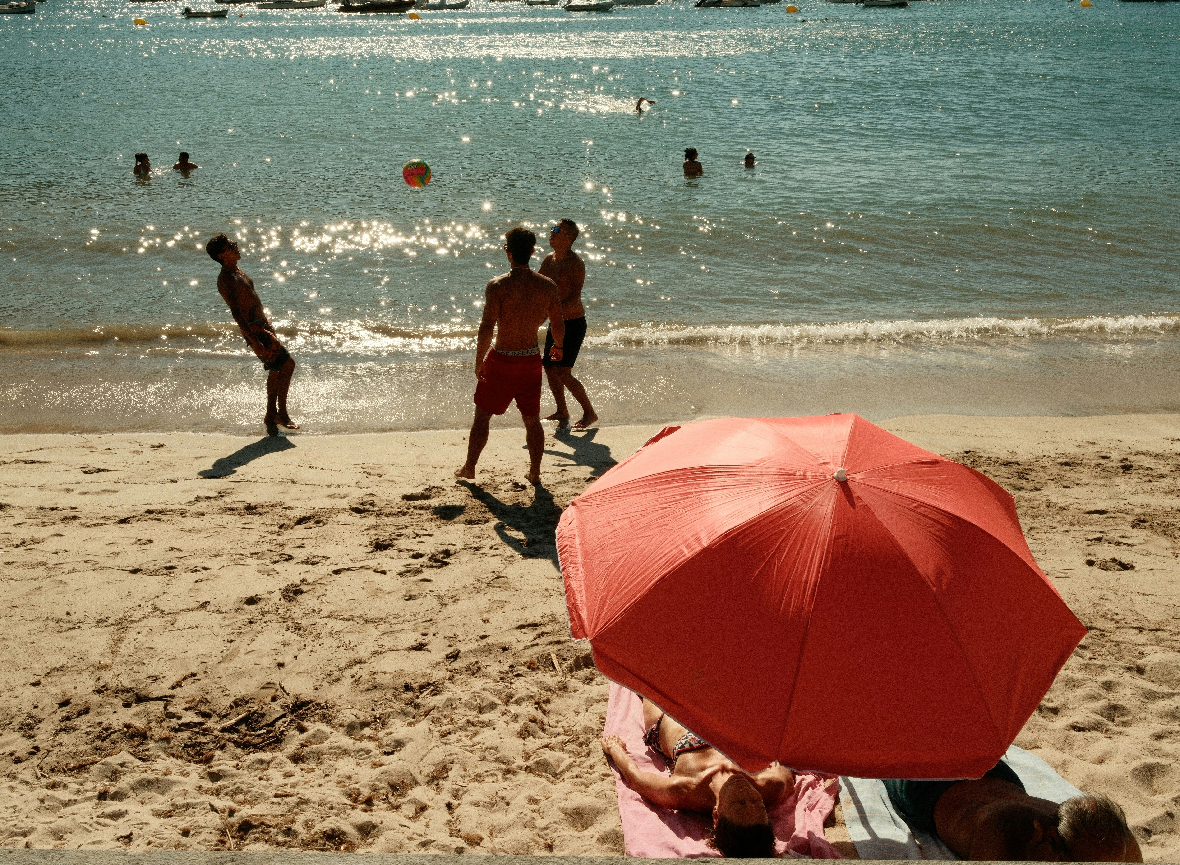 Red Umbrella at the Sunlit Beach Salsa