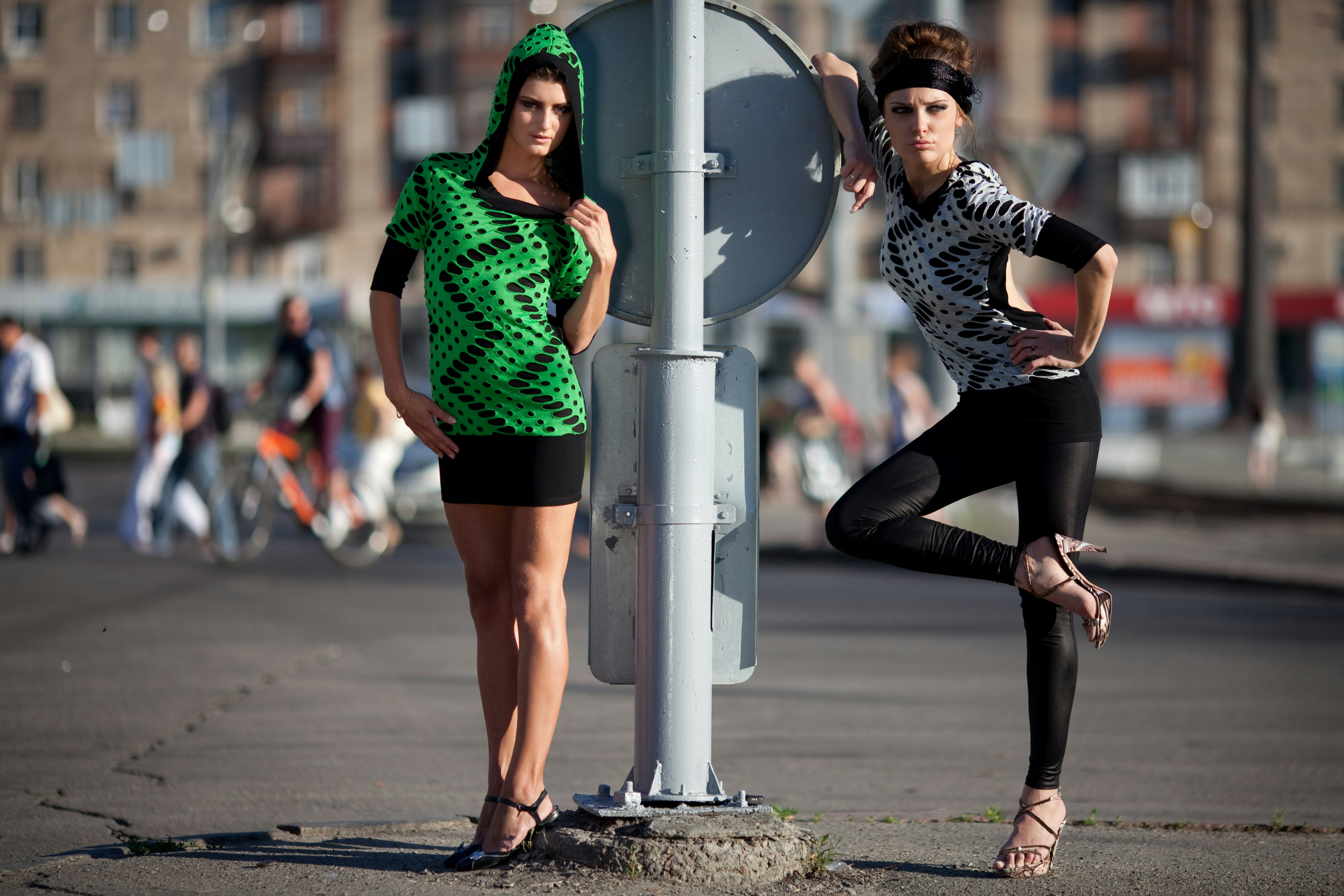 Two Fashionable Figures by the Urban Pillar