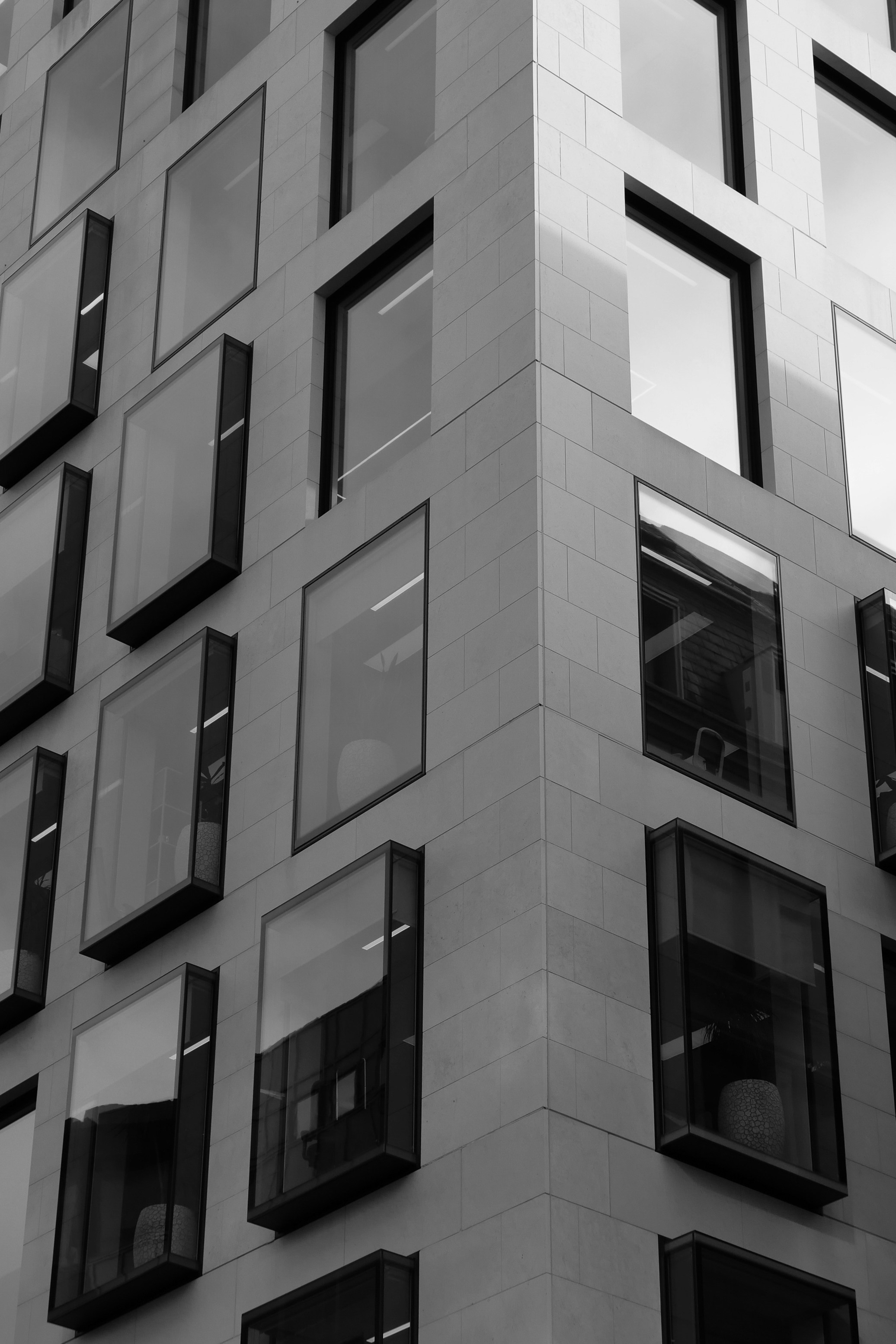Concrete Window Sonata: A Geometric Facade in Monochrome