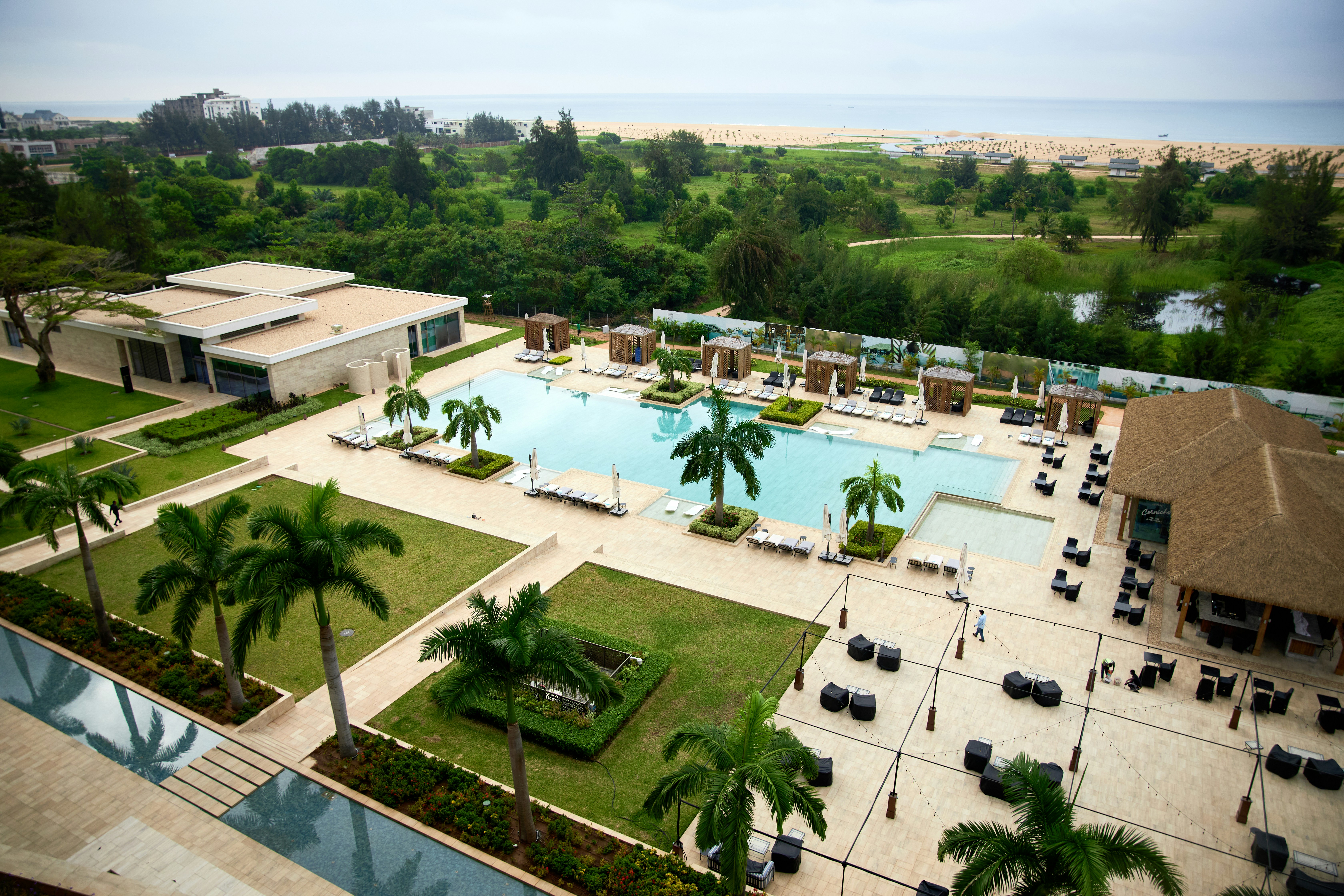 Terraced Poolscape Afloat Between Greenery and Sea