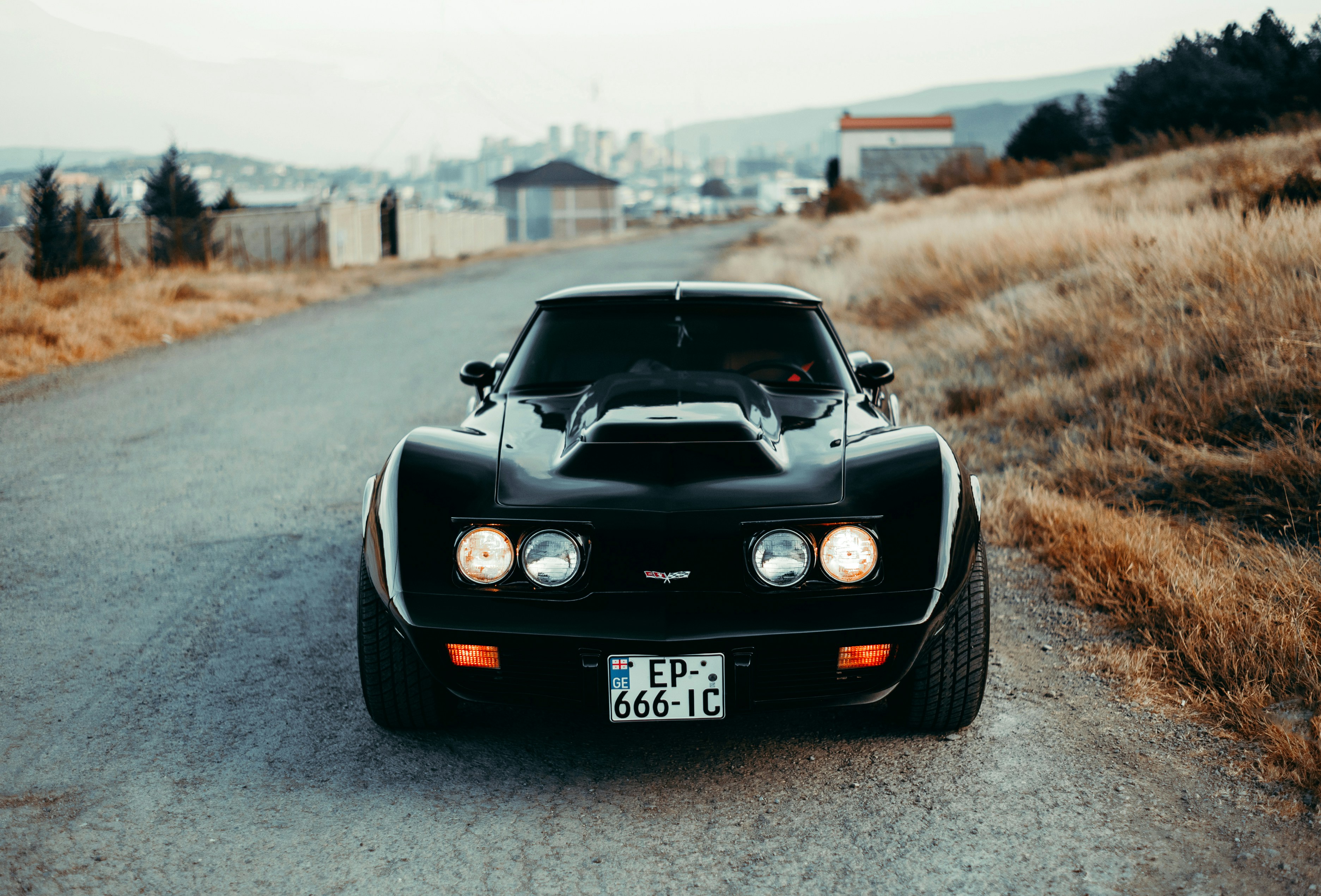 Midnight Power: A Classic Corvette Stares Down the Road