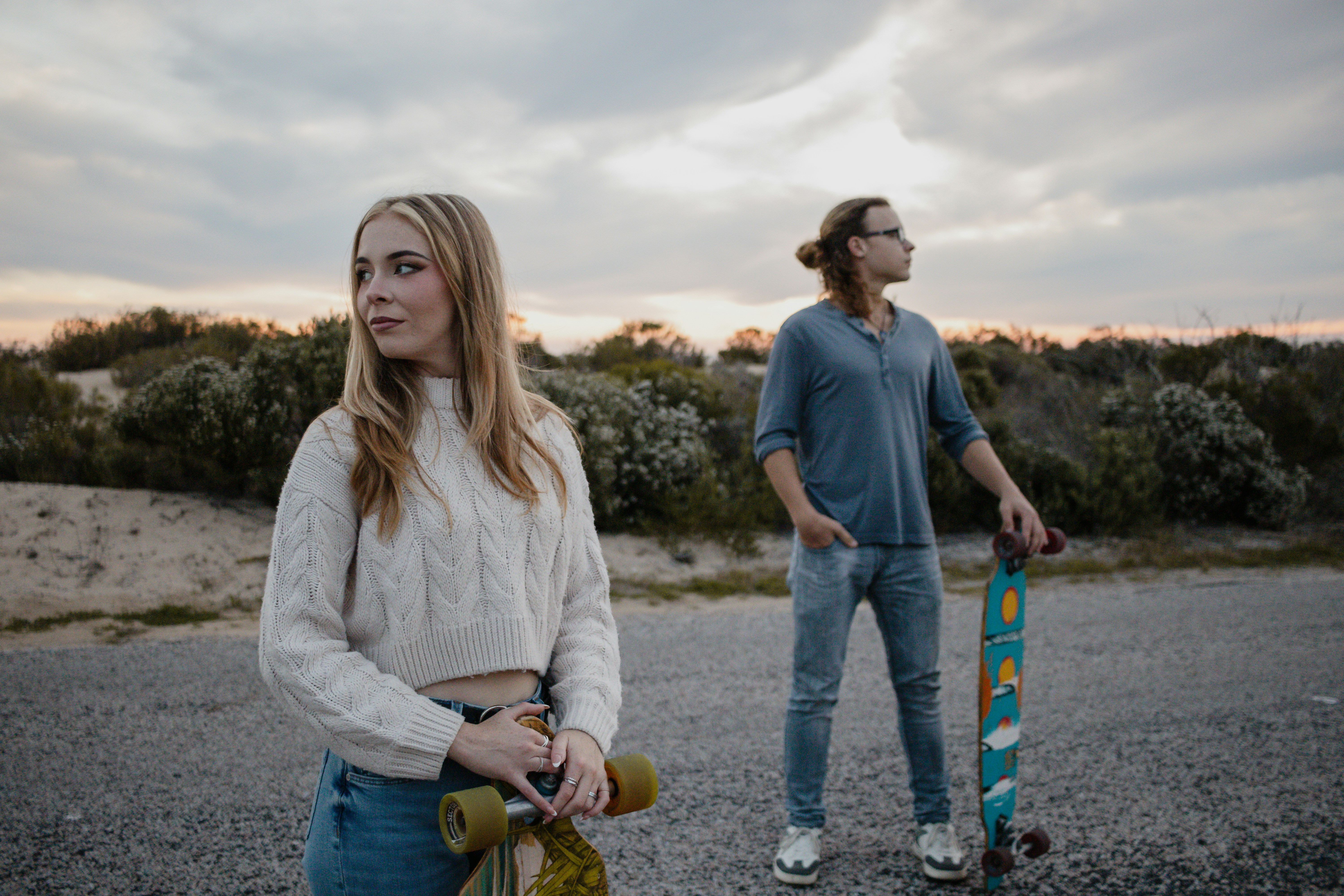 Two Teens in a Dusk-Soaked Driveaway