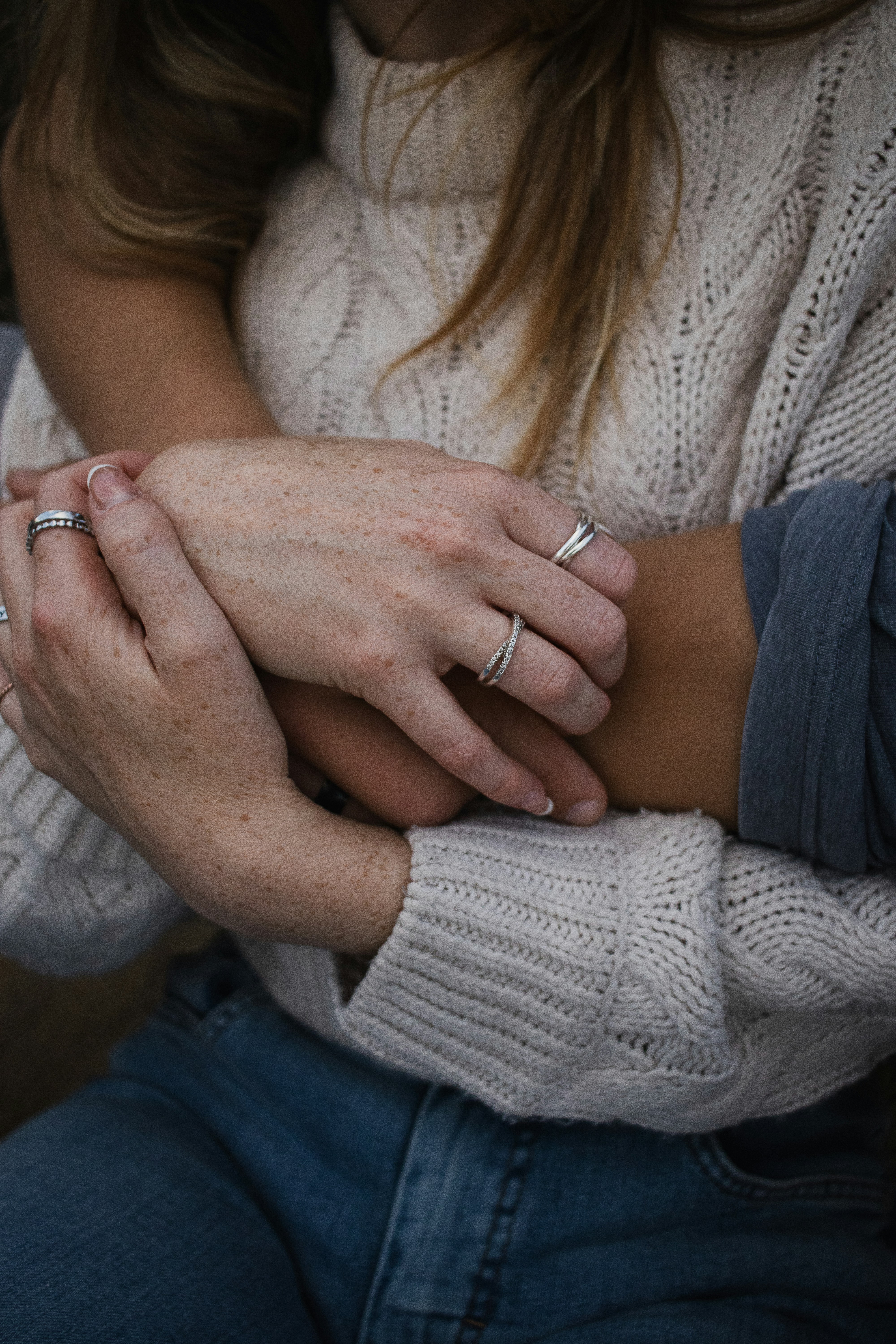 Interwoven Hands: A Quiet Moment of Support