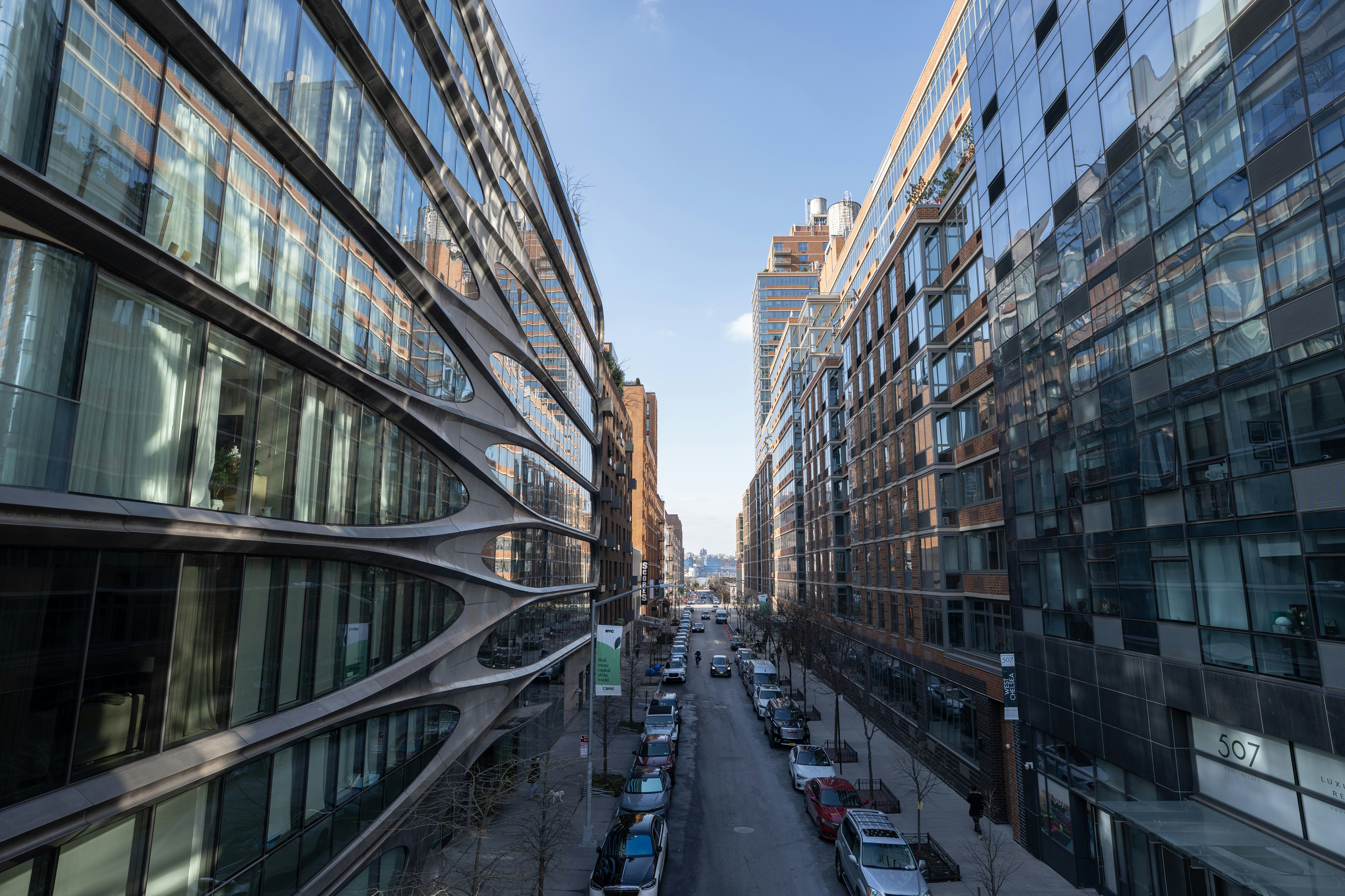 Urban Gorge: A Central Avenue Bounded by Glass and Steel