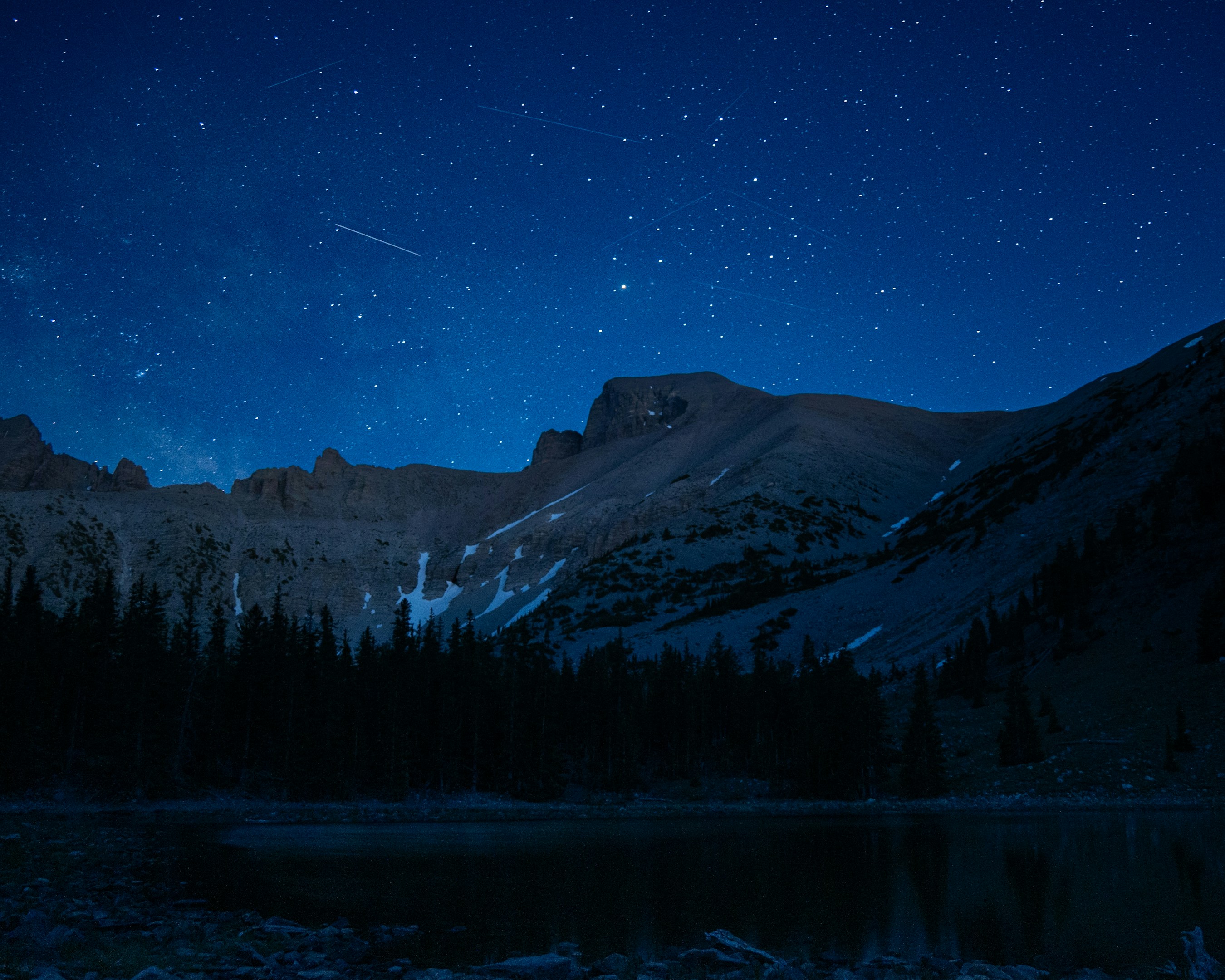 Starlit Ridge: A Quiet Night Over the Frozen Lake