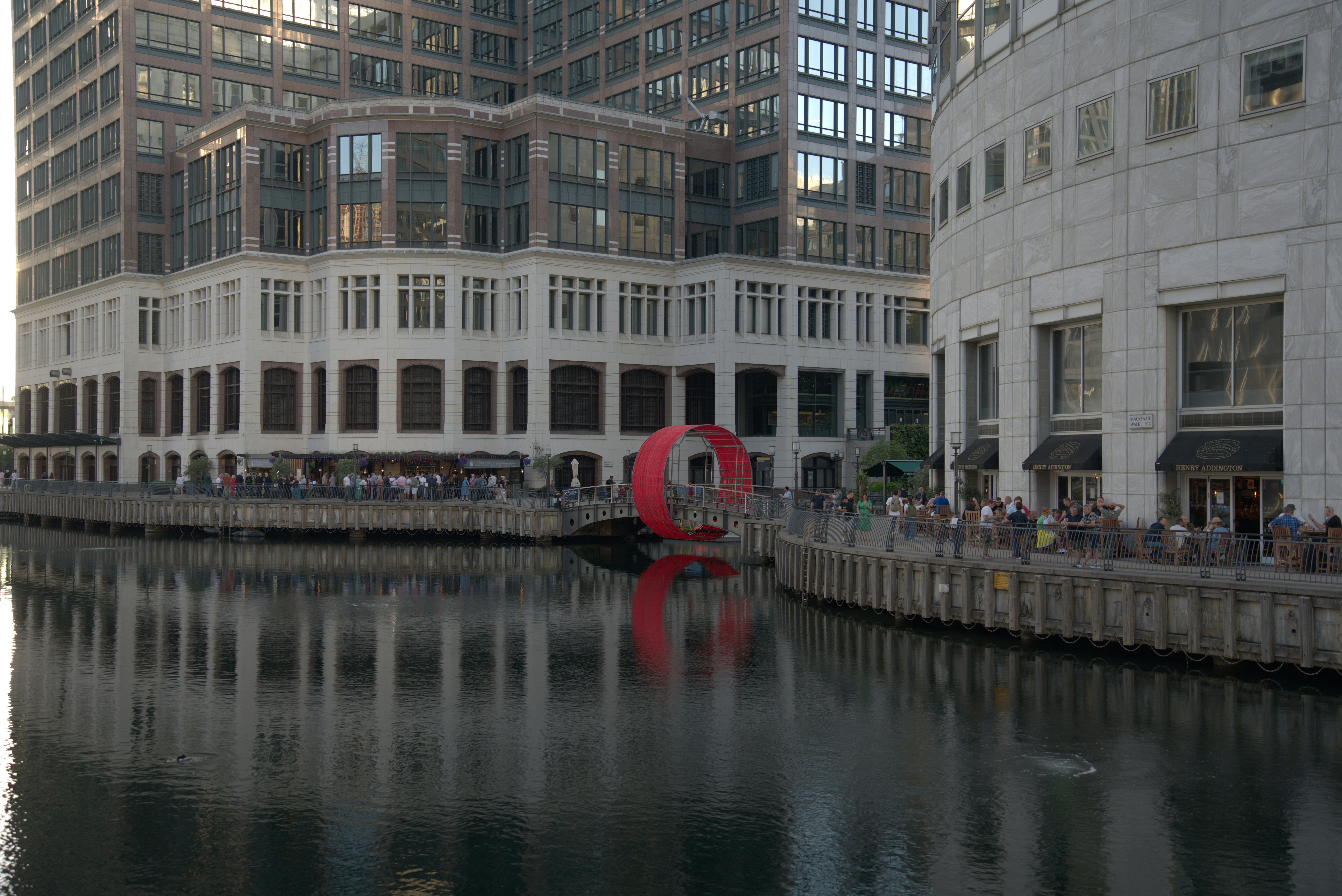 Red Ring and Riverside Facade: A Quiet Moment by the Chicago River