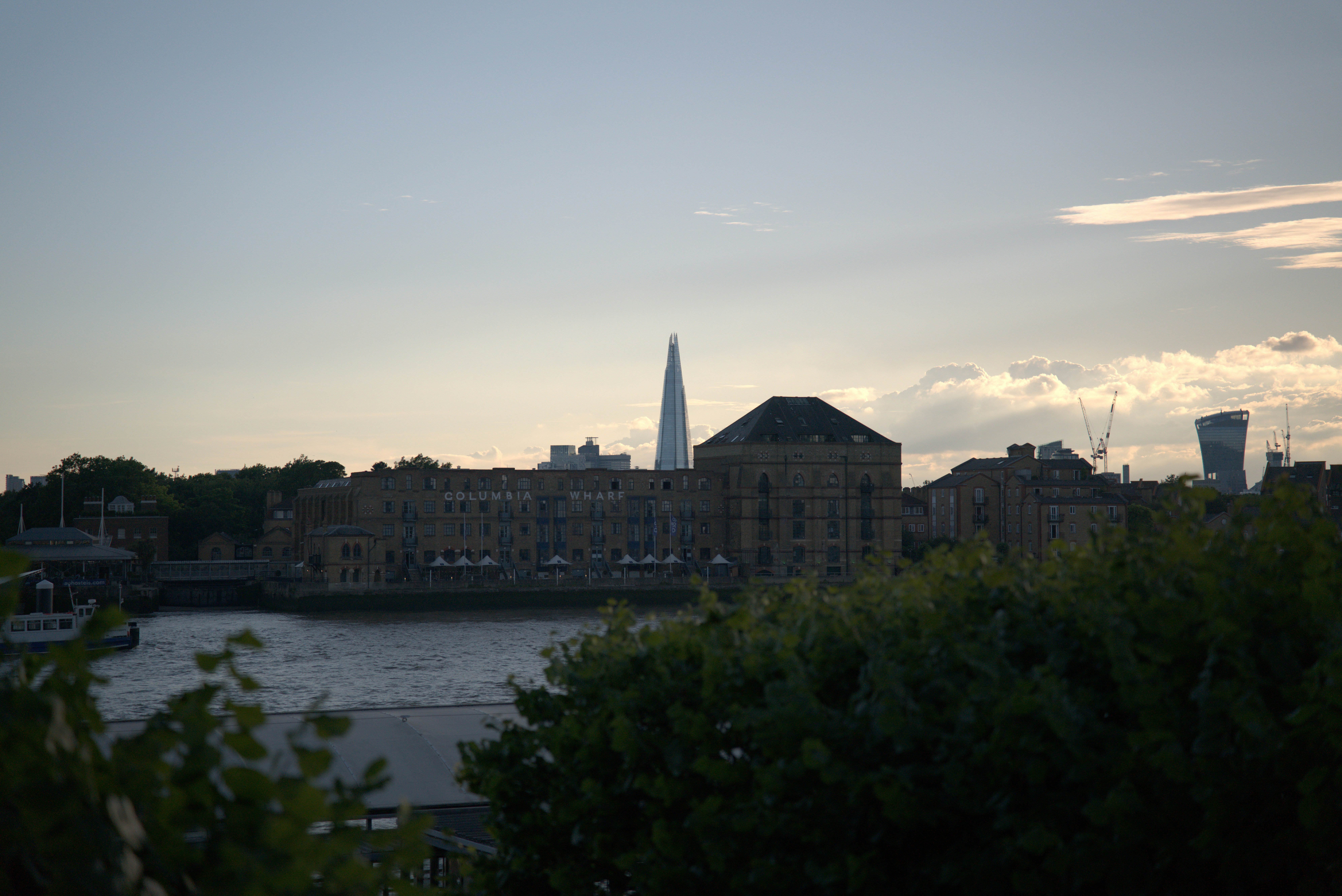 Dusk Behind the Thames: The City Silhouette from Riverside Greens