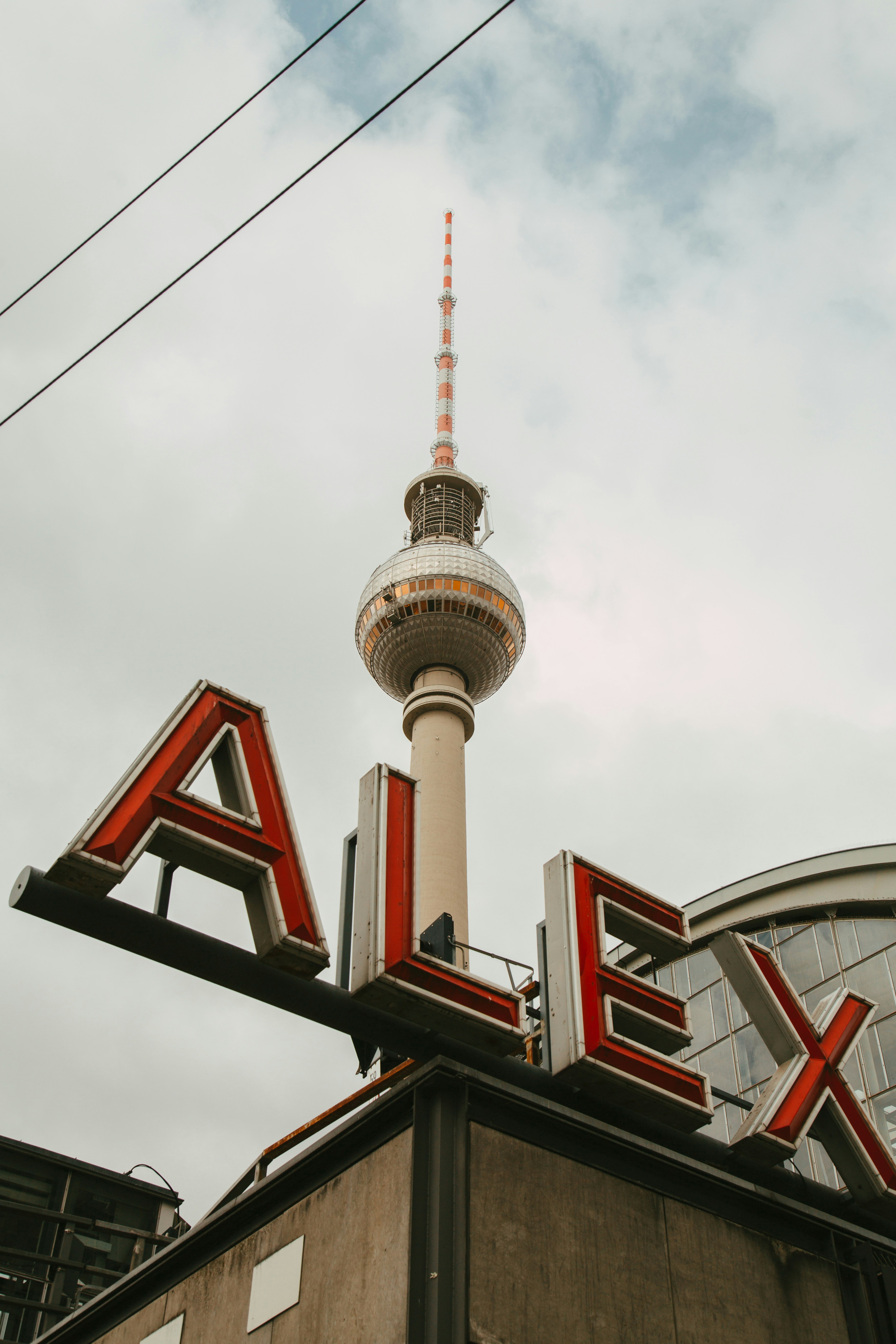 Berlin Skyline: TV Tower Peeking Over Neon Letters