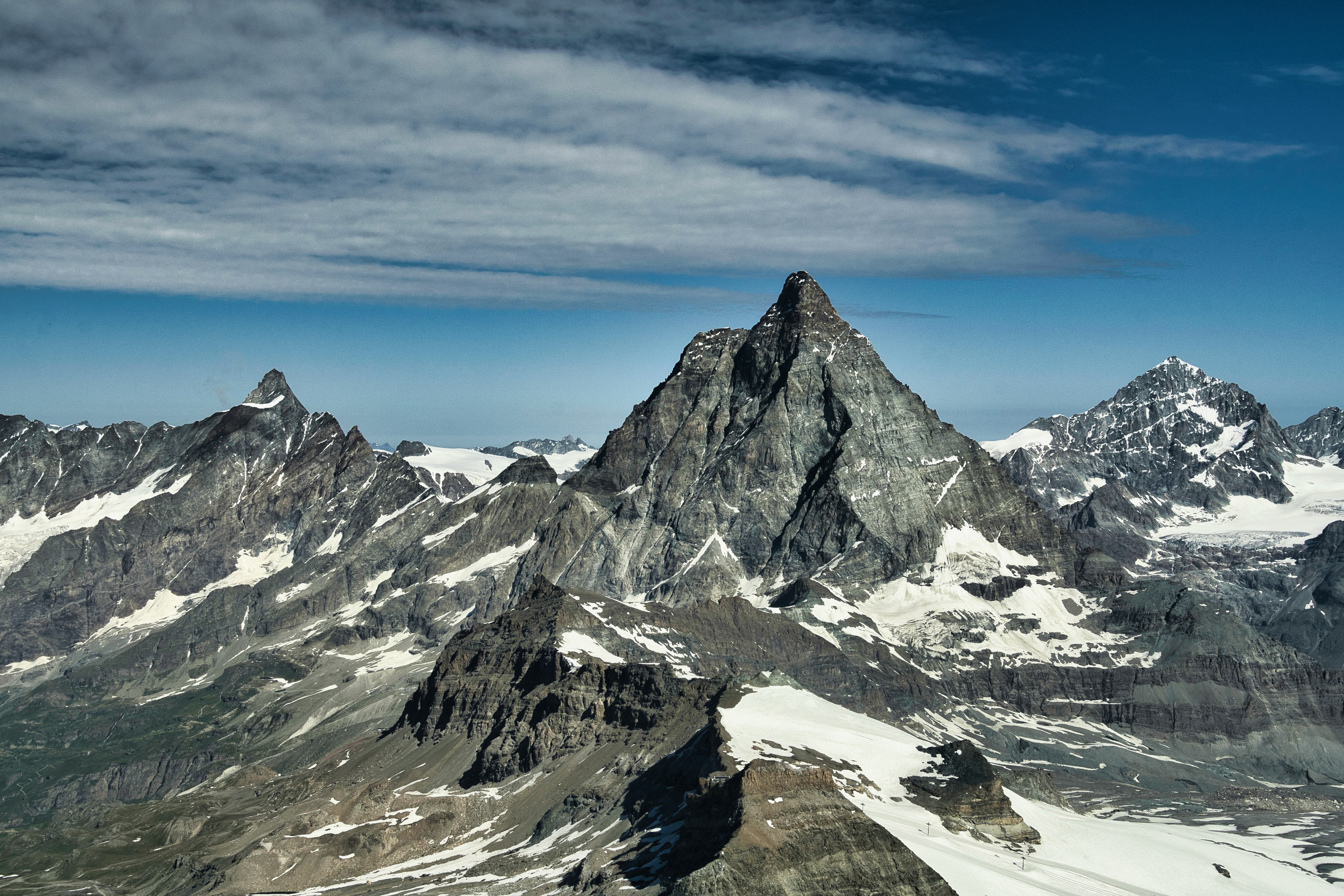Crown of Ice: A Tinted Peak Pierces the High Sky