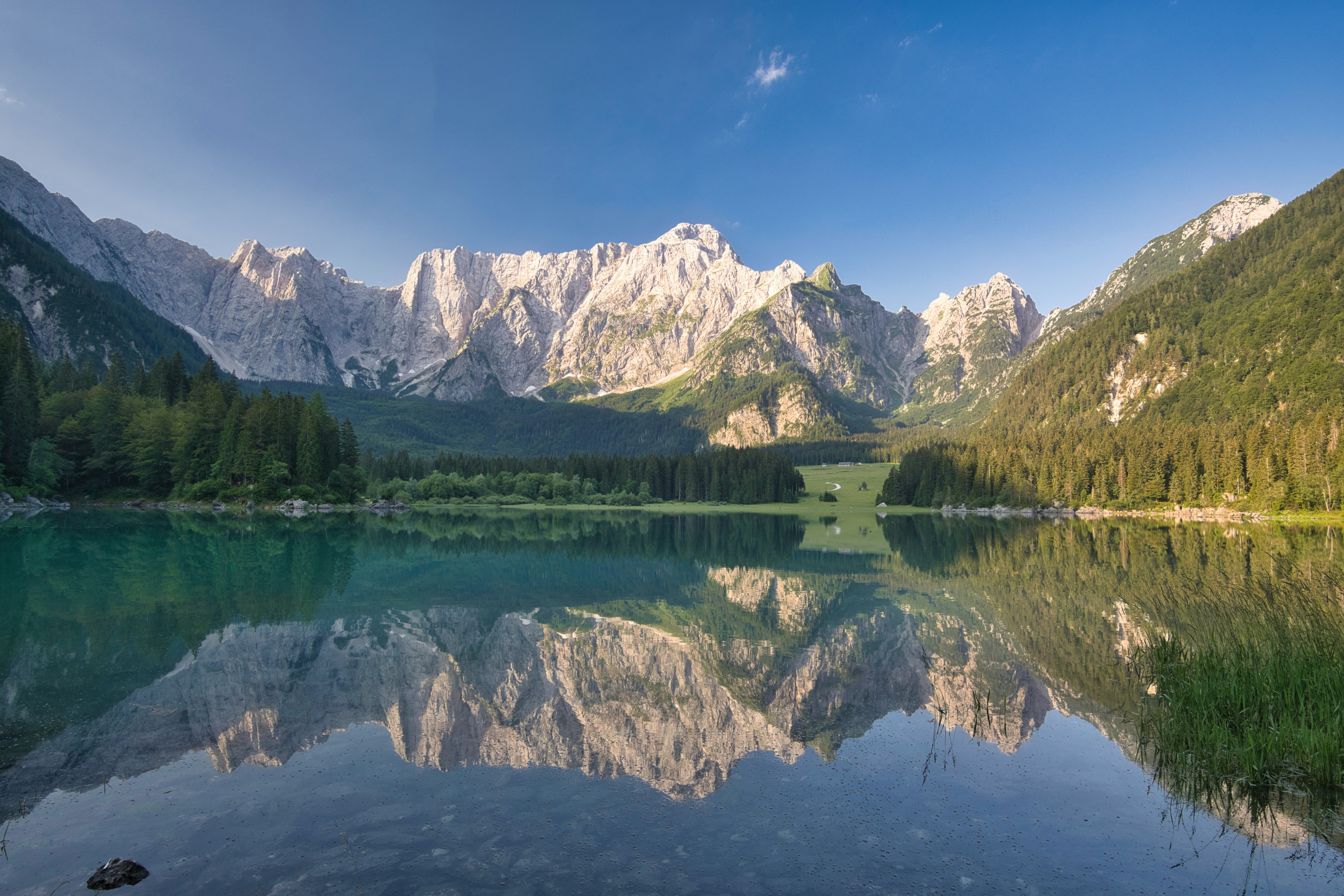 Mirror of Alpine Peaks Across a Quiet Lake