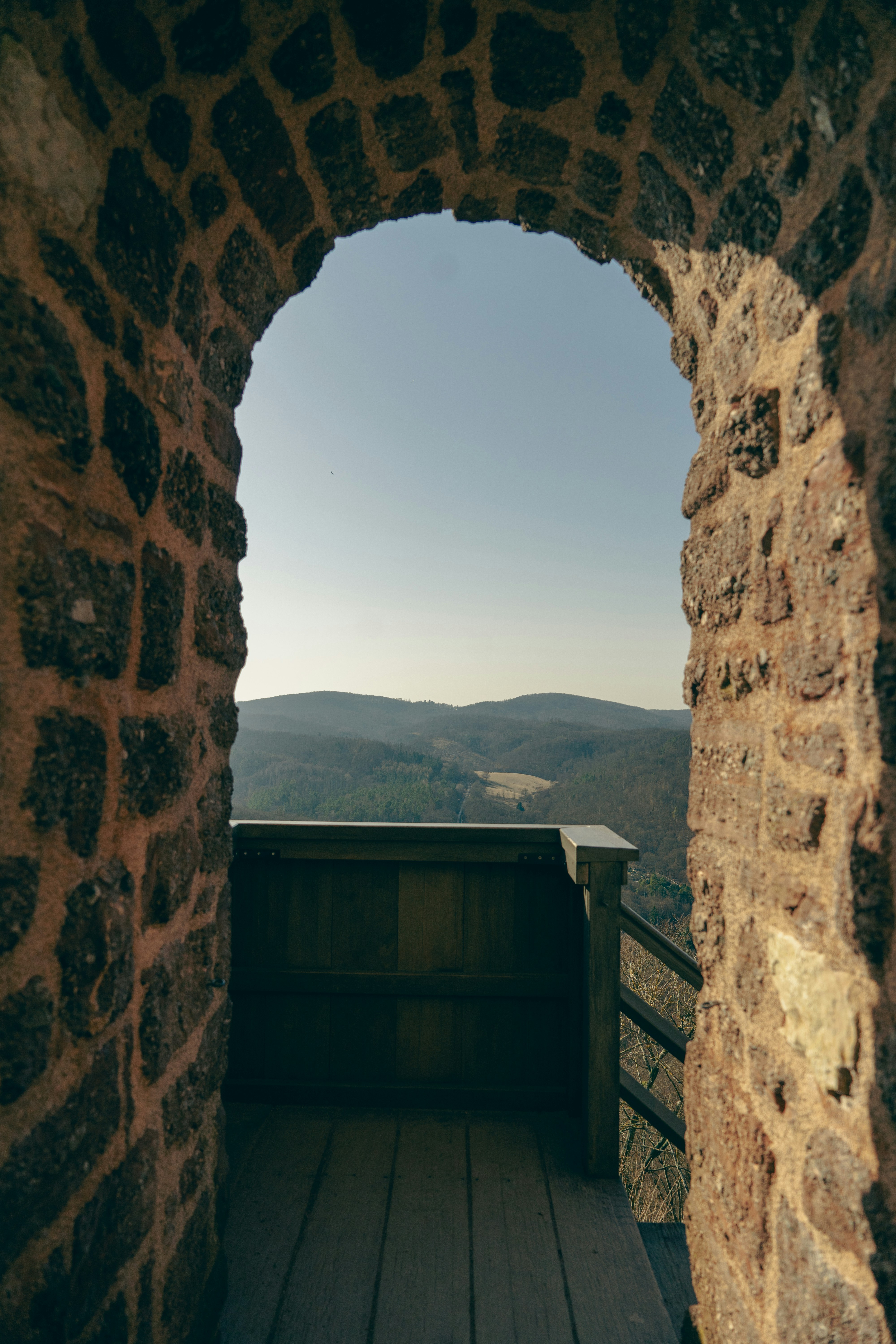 Stone Archway Framing a Distant Ridge