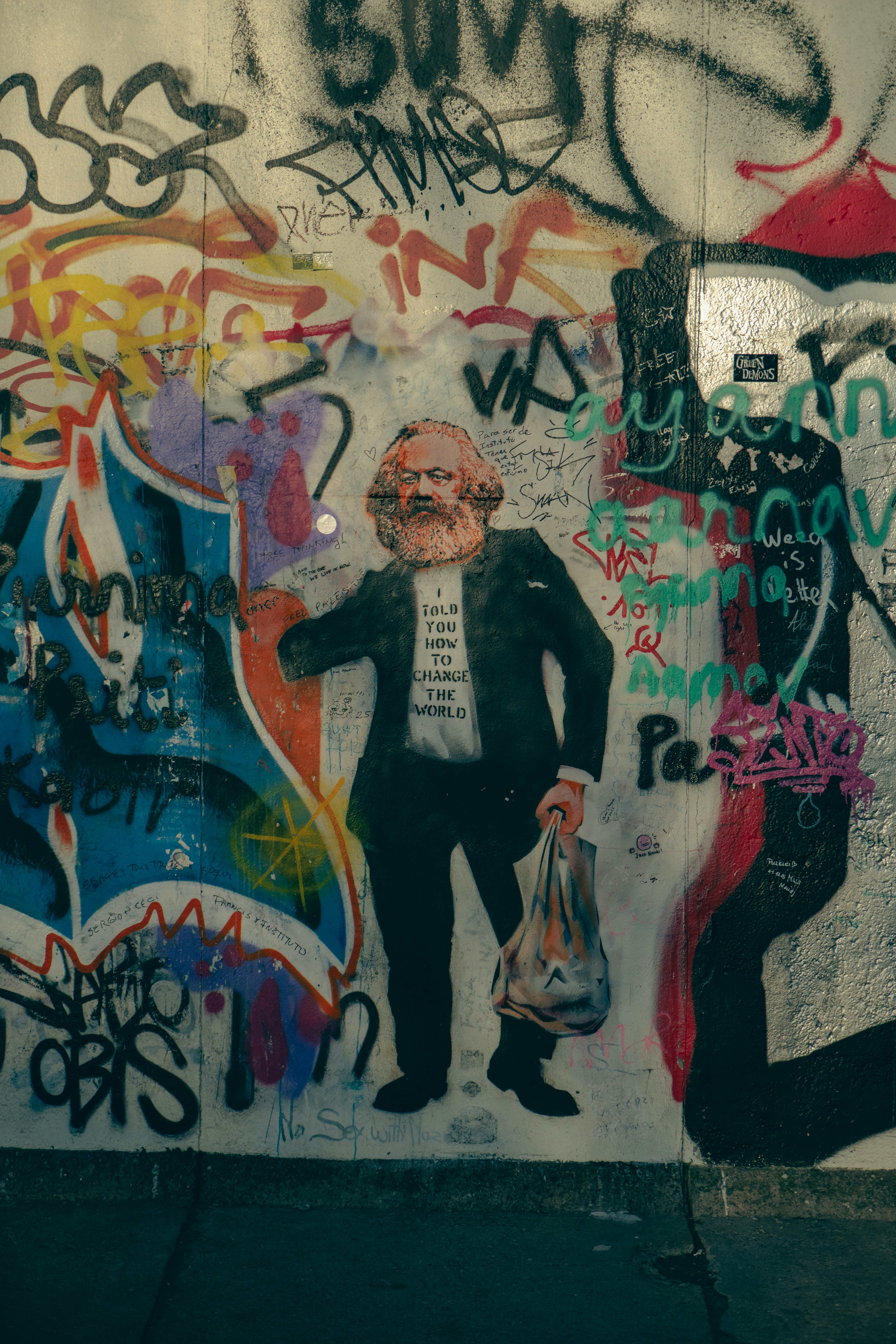 Graffitied Wall Portrait: The Bearded Man with Shopping Bag