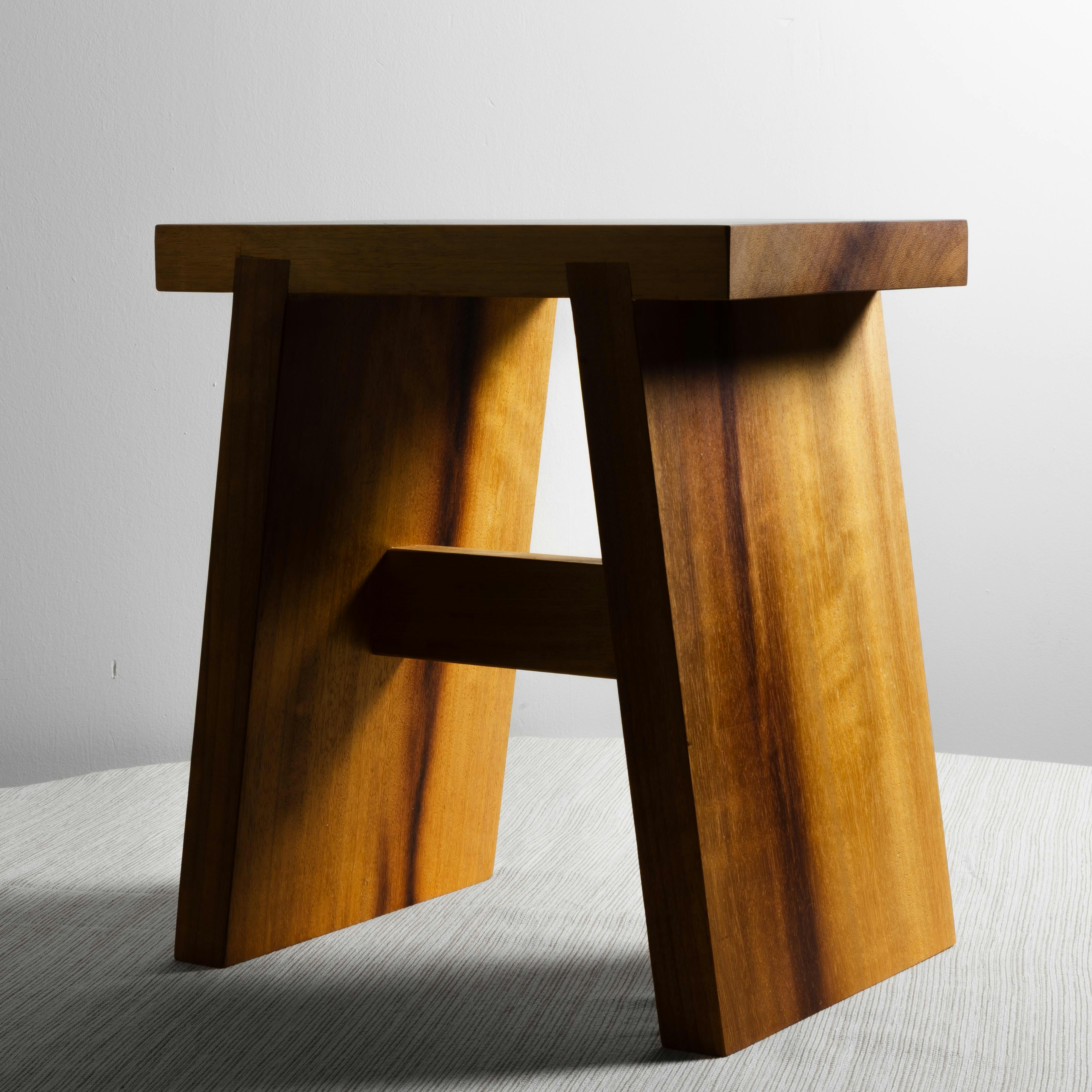 Curved Shadow: A Minimal Wooden Stool Plays with Light