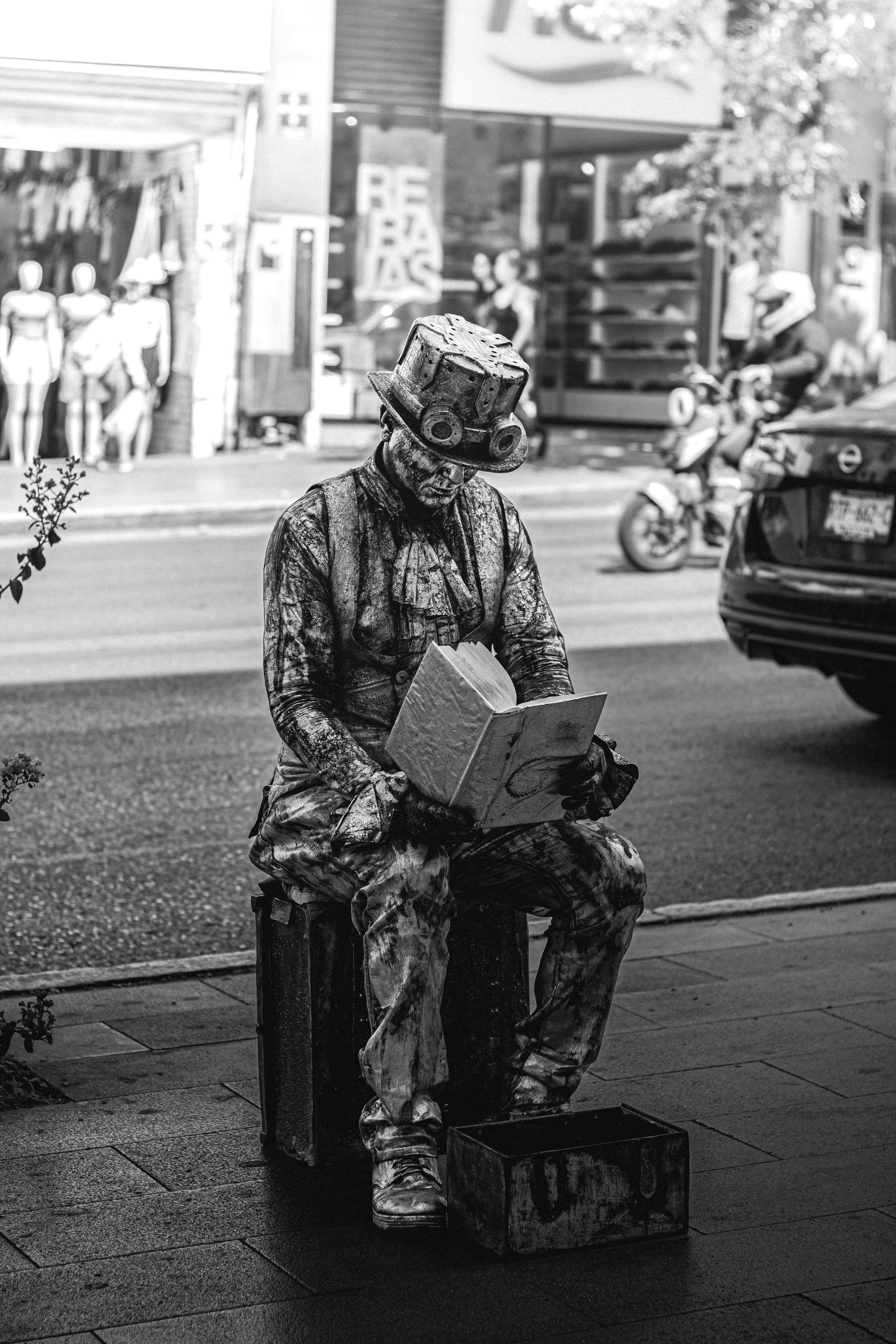 Street Painter of Silence: The Reader in a Coal-Smeared Suit