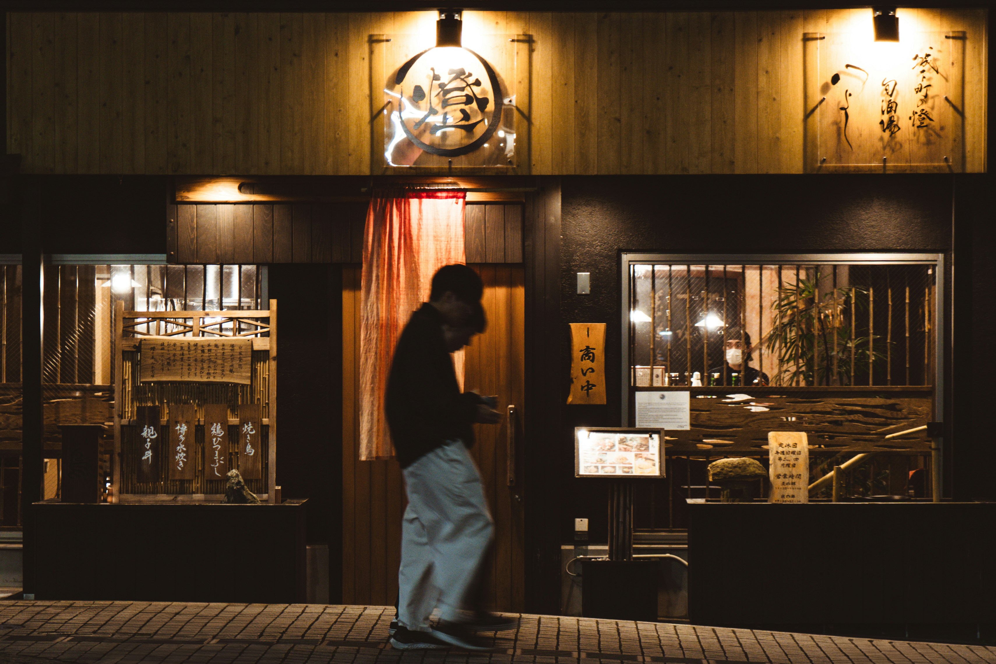 Quiet Night Stroll Past a Warm-Glowing Japanese Facade