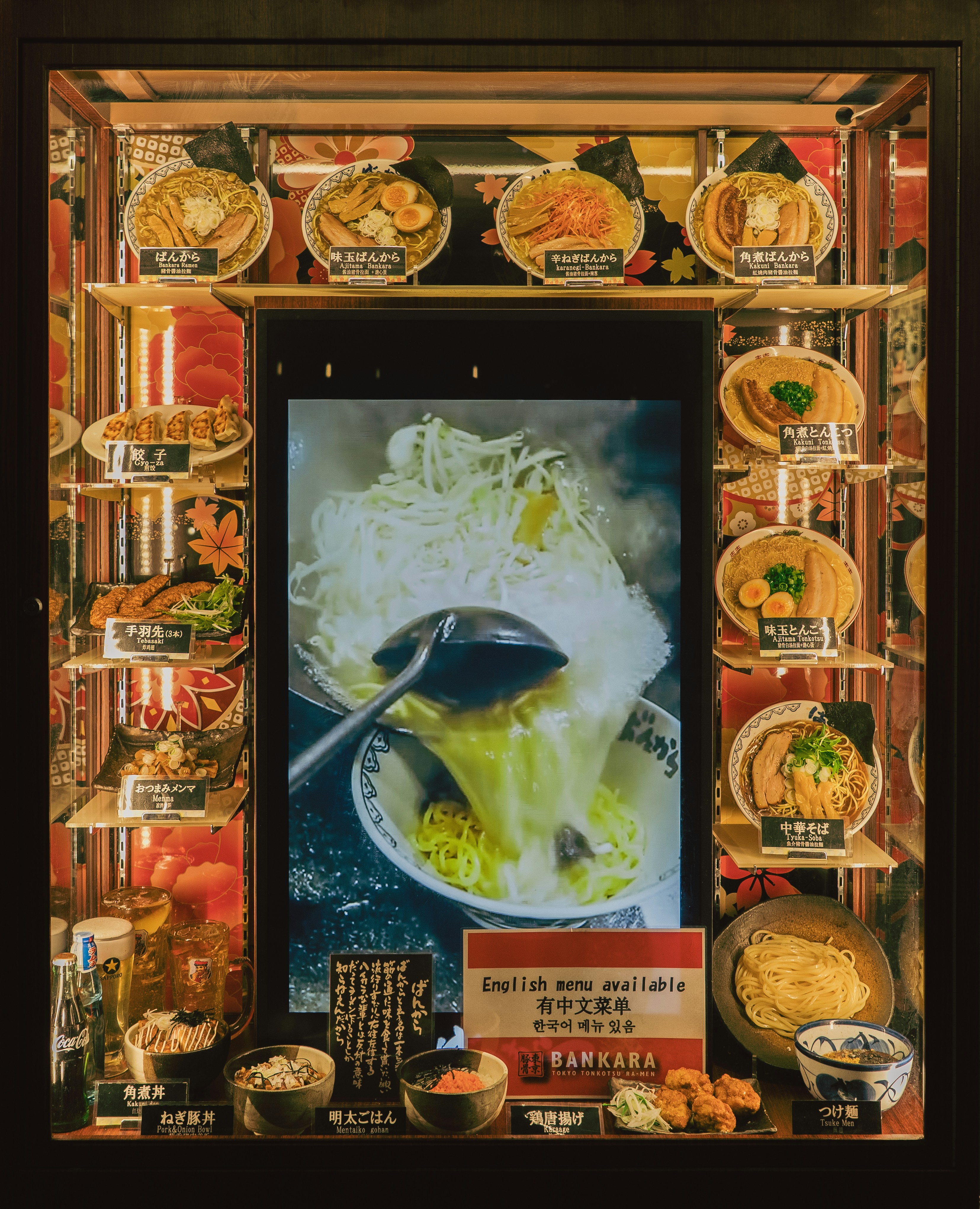 Vivid Ramen Window: Bowl of Steam Amid Neon Display