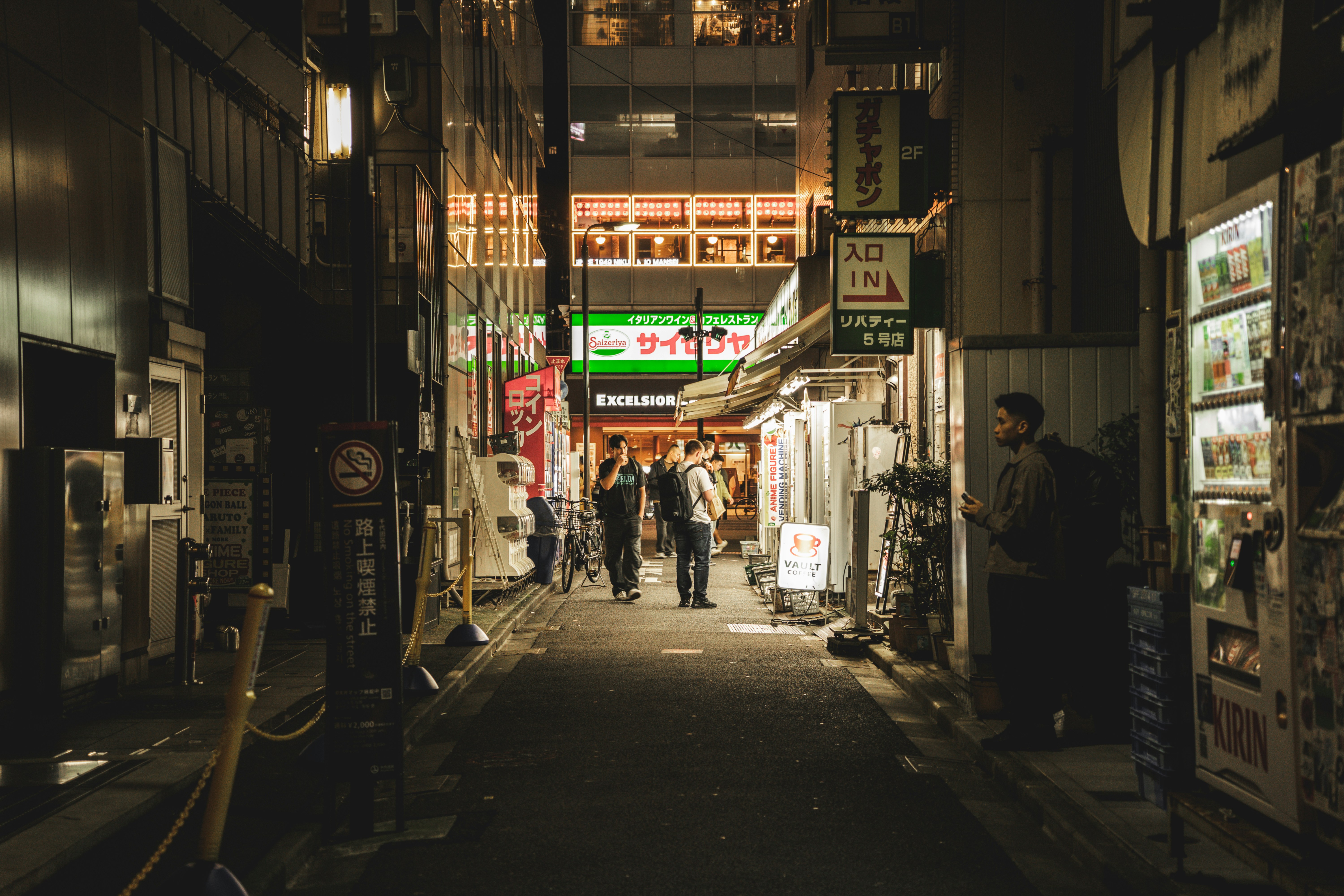 Neon Corridor: Quiet Nightlife Amid Neon Alleyways