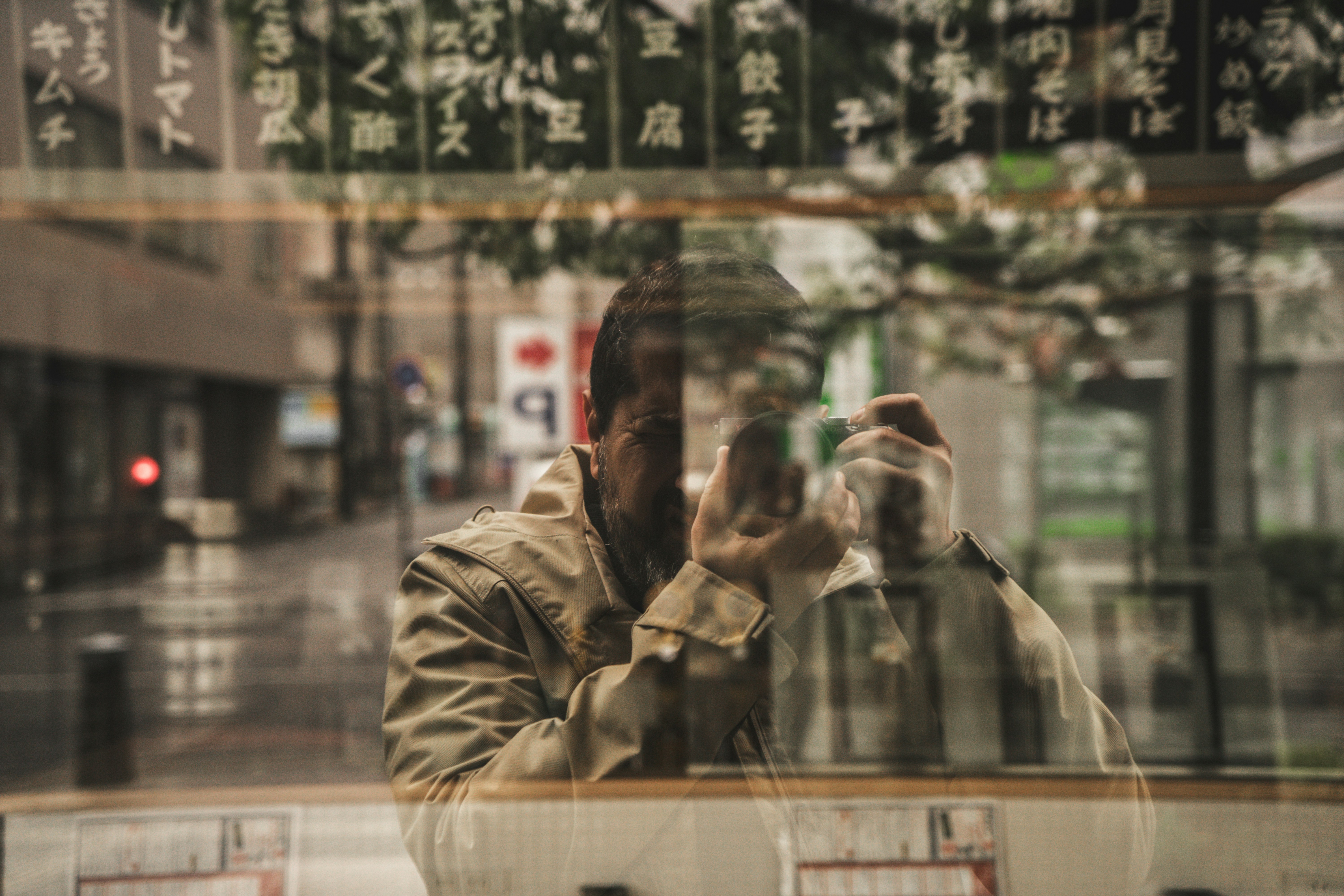 Reflected Street Portrait in a City Window