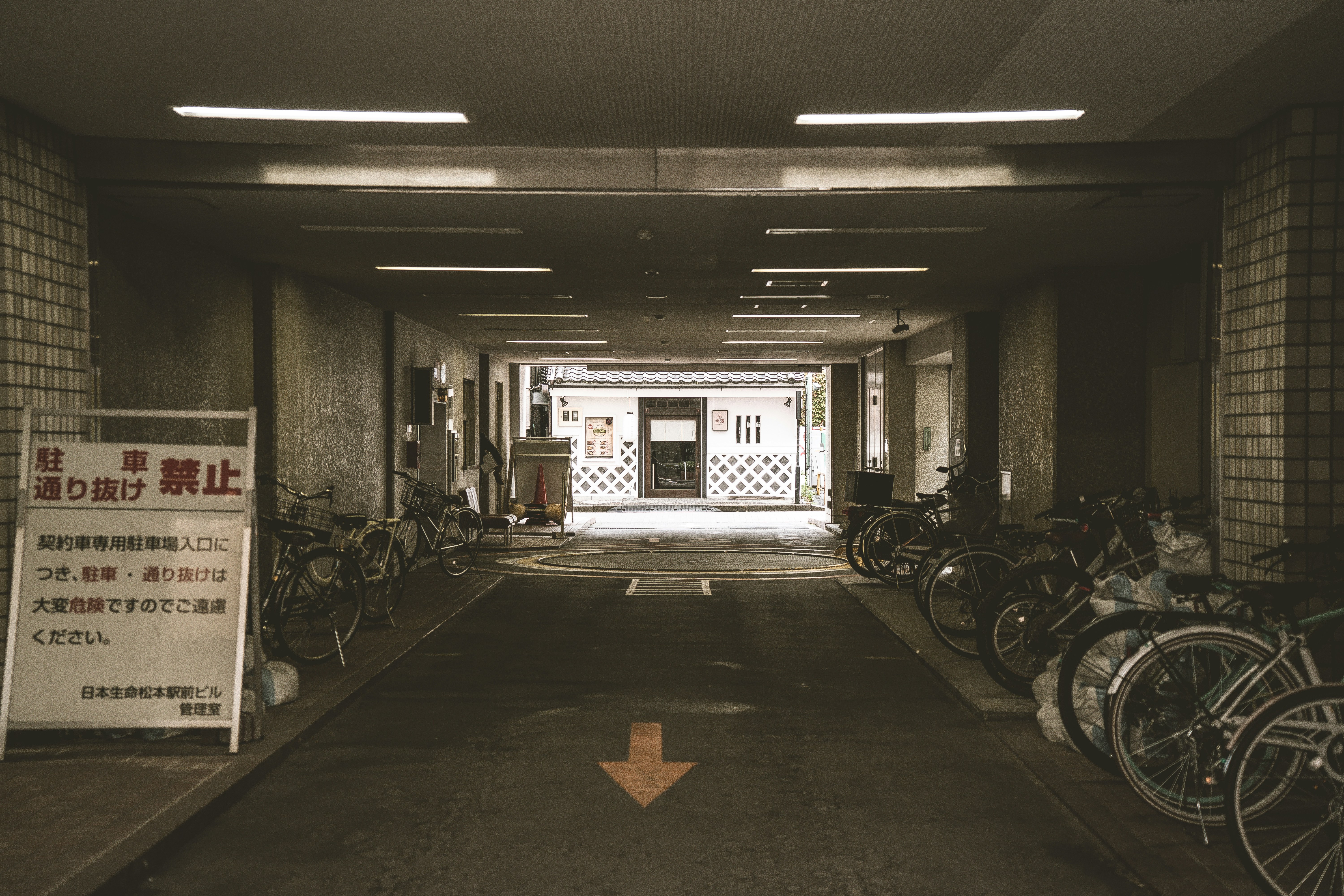 Underpass Corridor Toward the Bright Exit