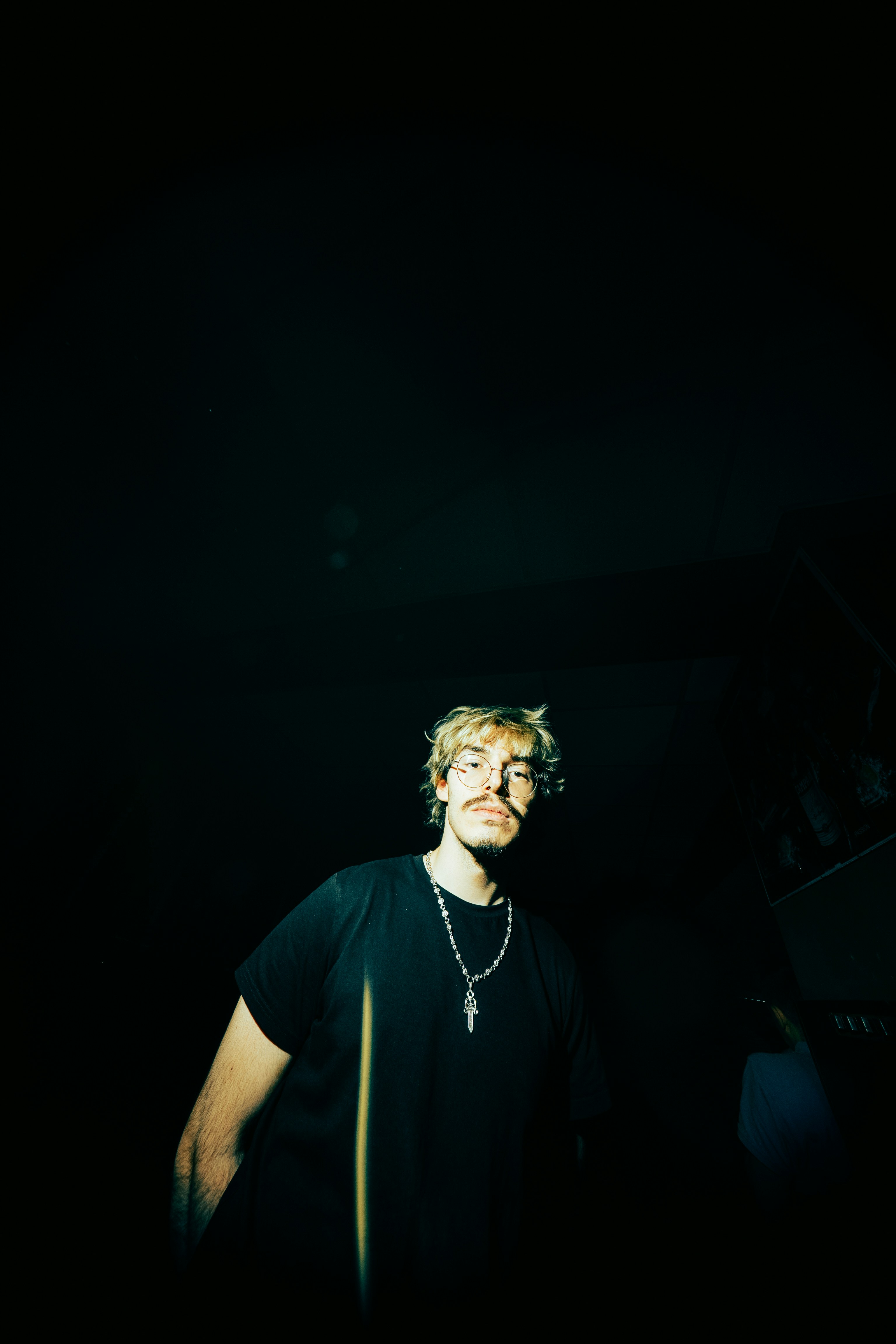 Understage Glow: A Lone Portrait in Midnight Club Lighting