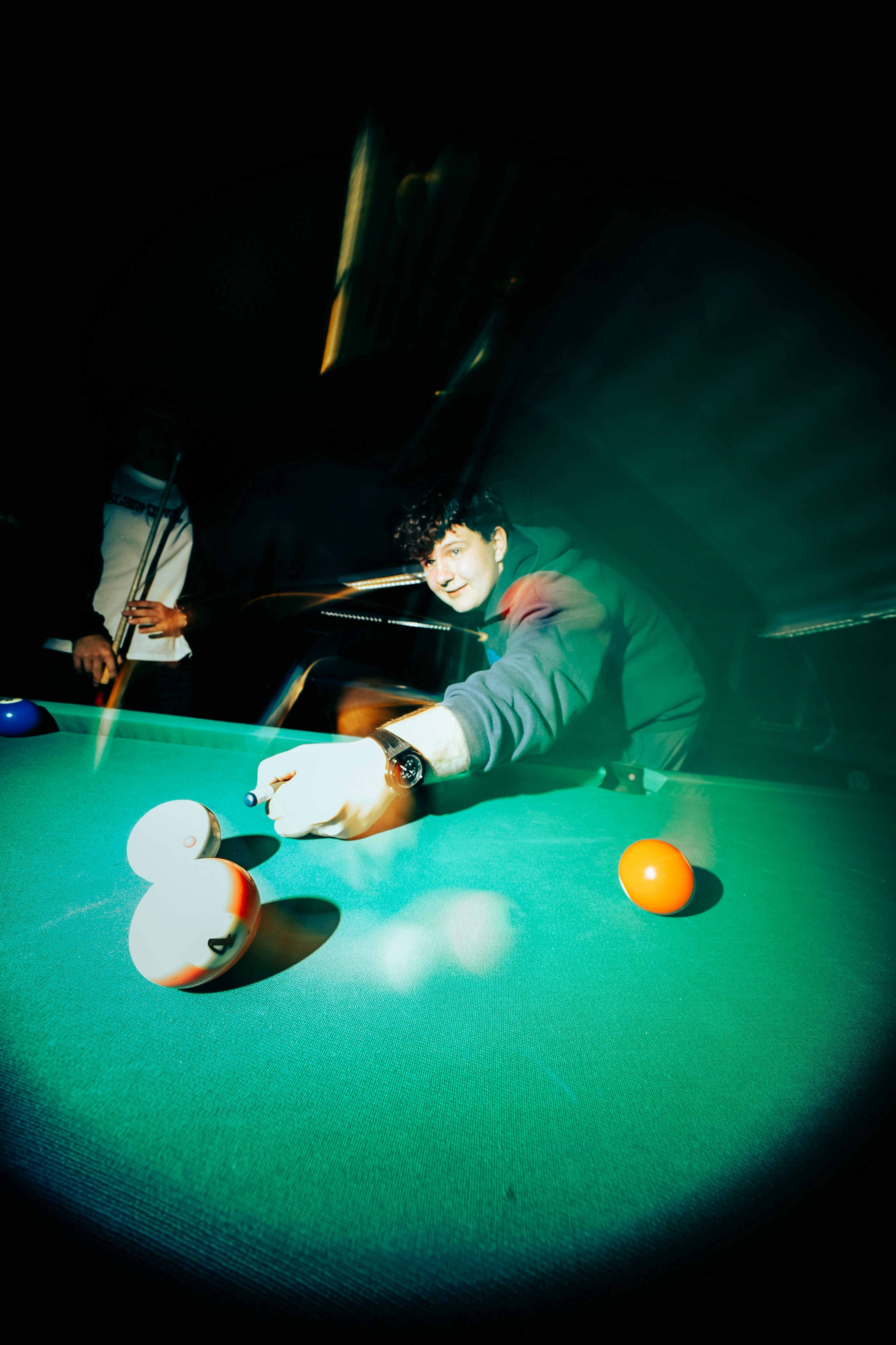 Pocketed Focus: A Pool Hall Moment in Motion