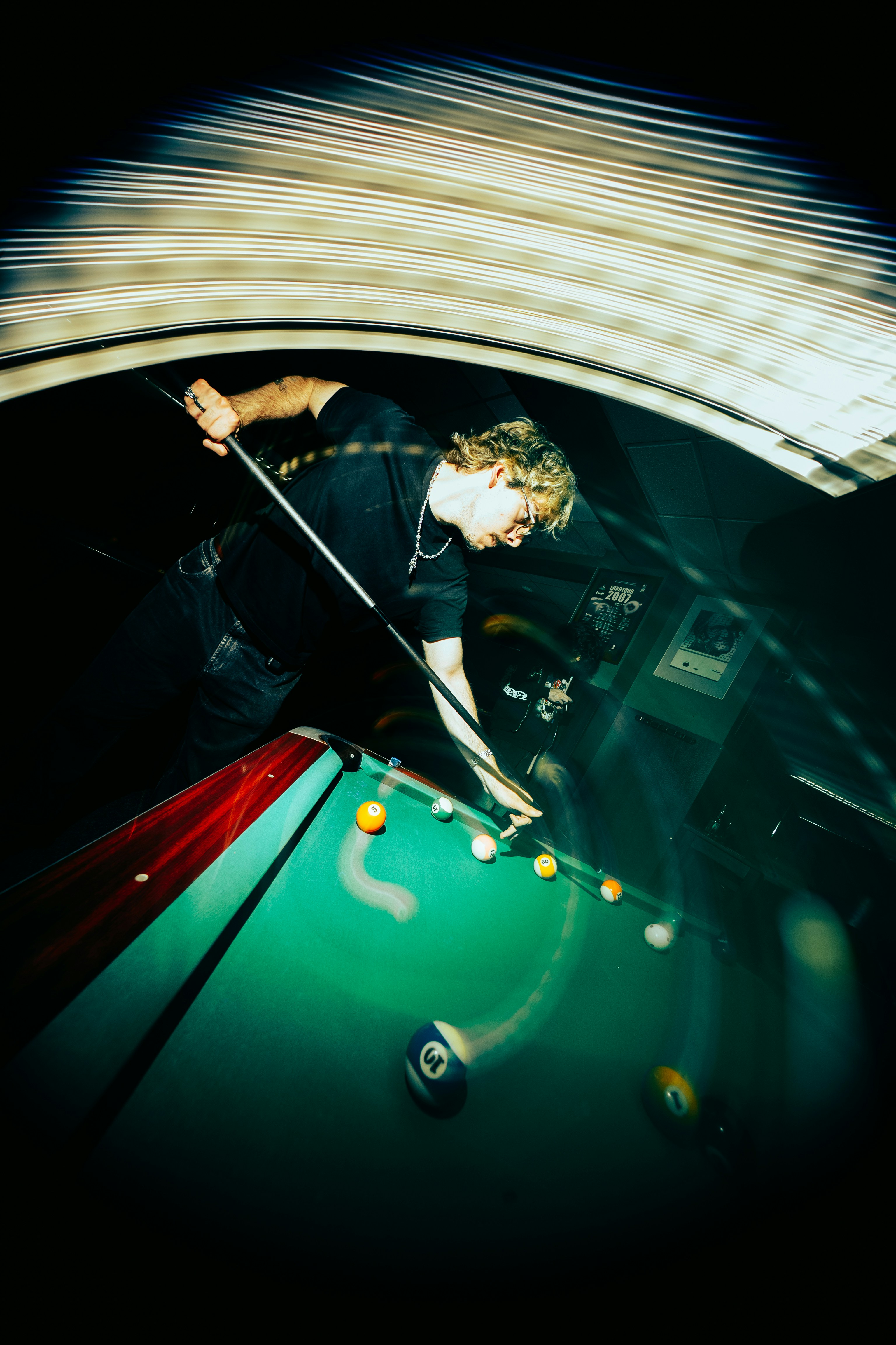 Cueing the Arc: A Vinyl-Illuminated Standoff at the Pool Table