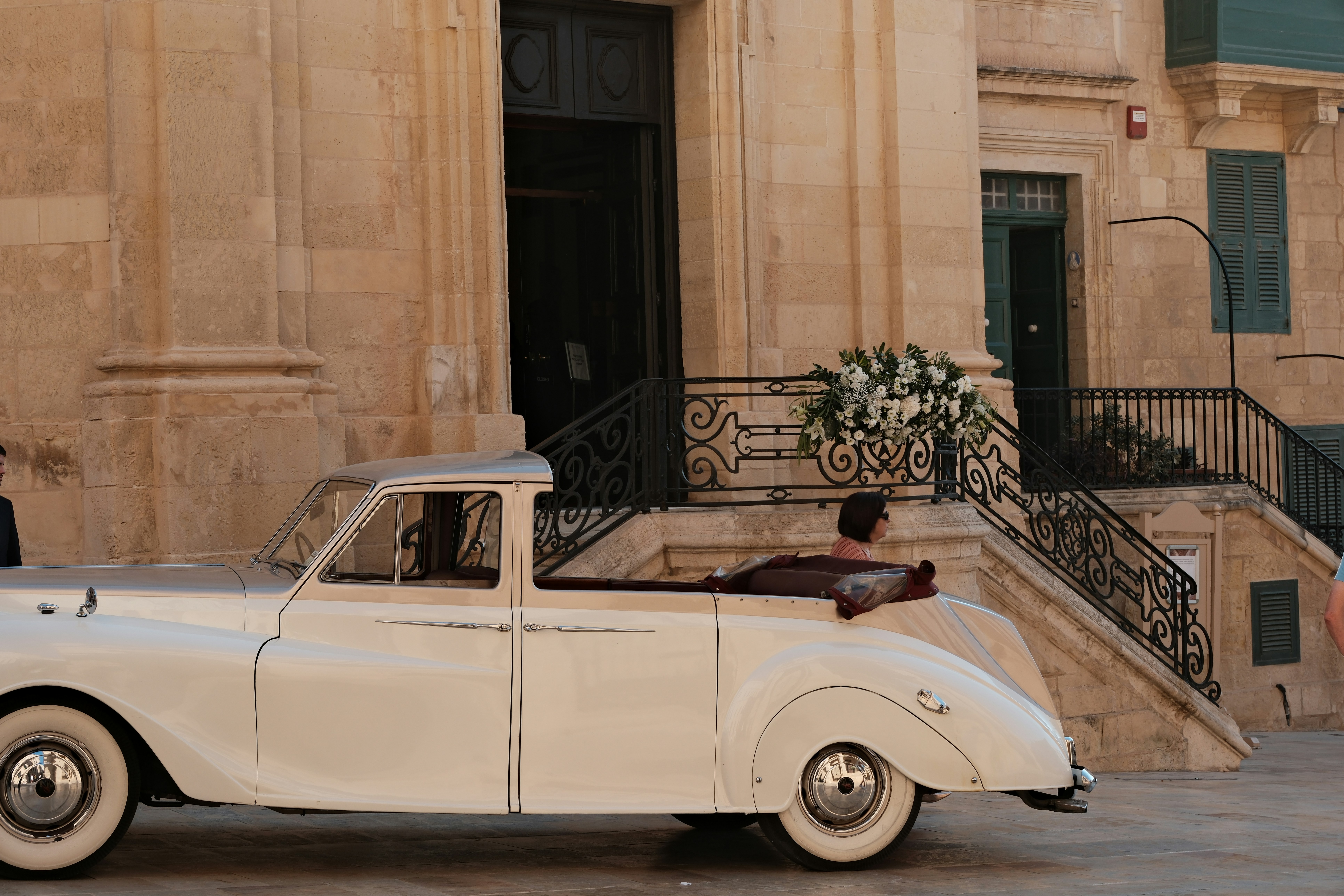 Tailfin Elegance in Sunlit Piazza