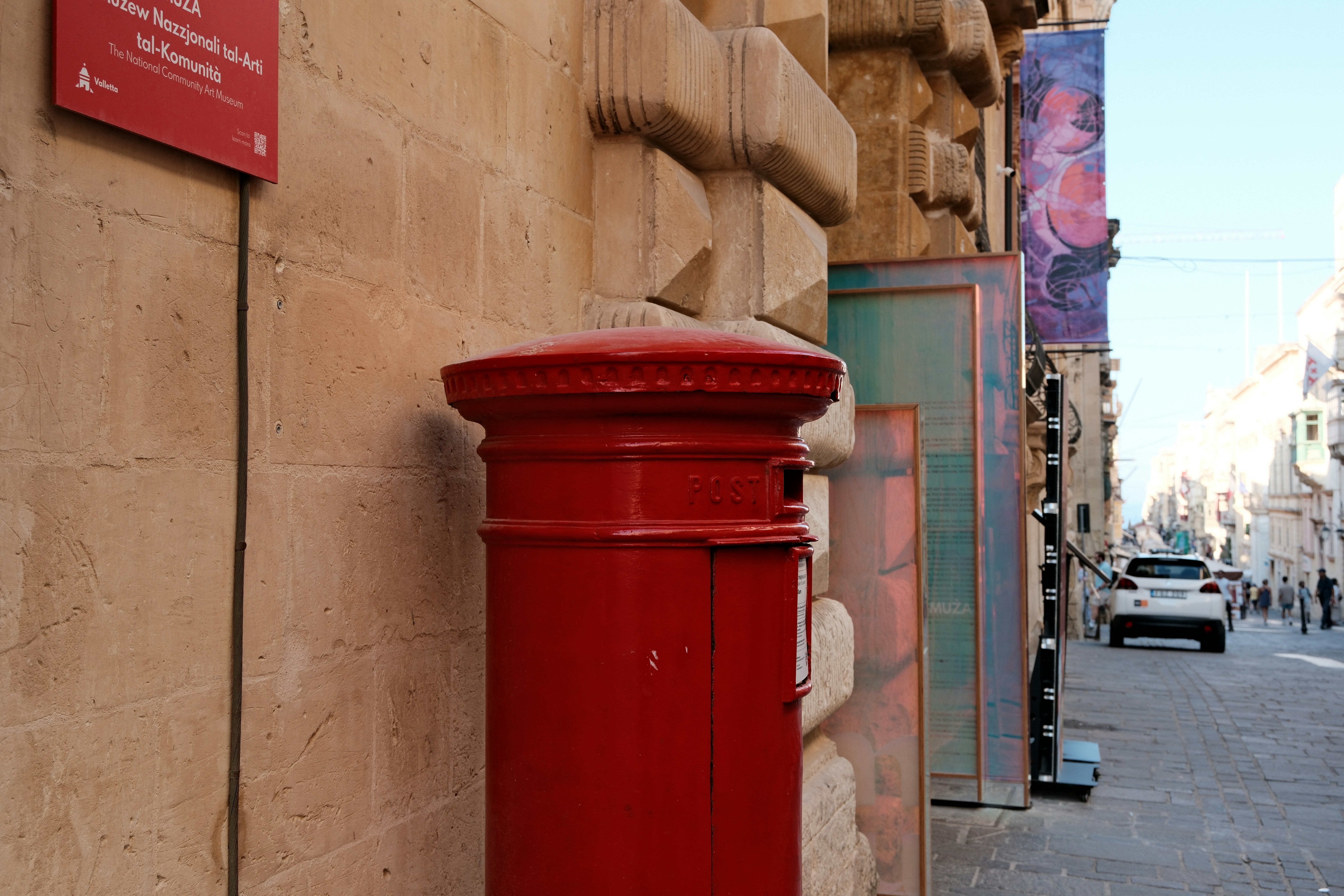 Red Mailbox on a Quiet City Street