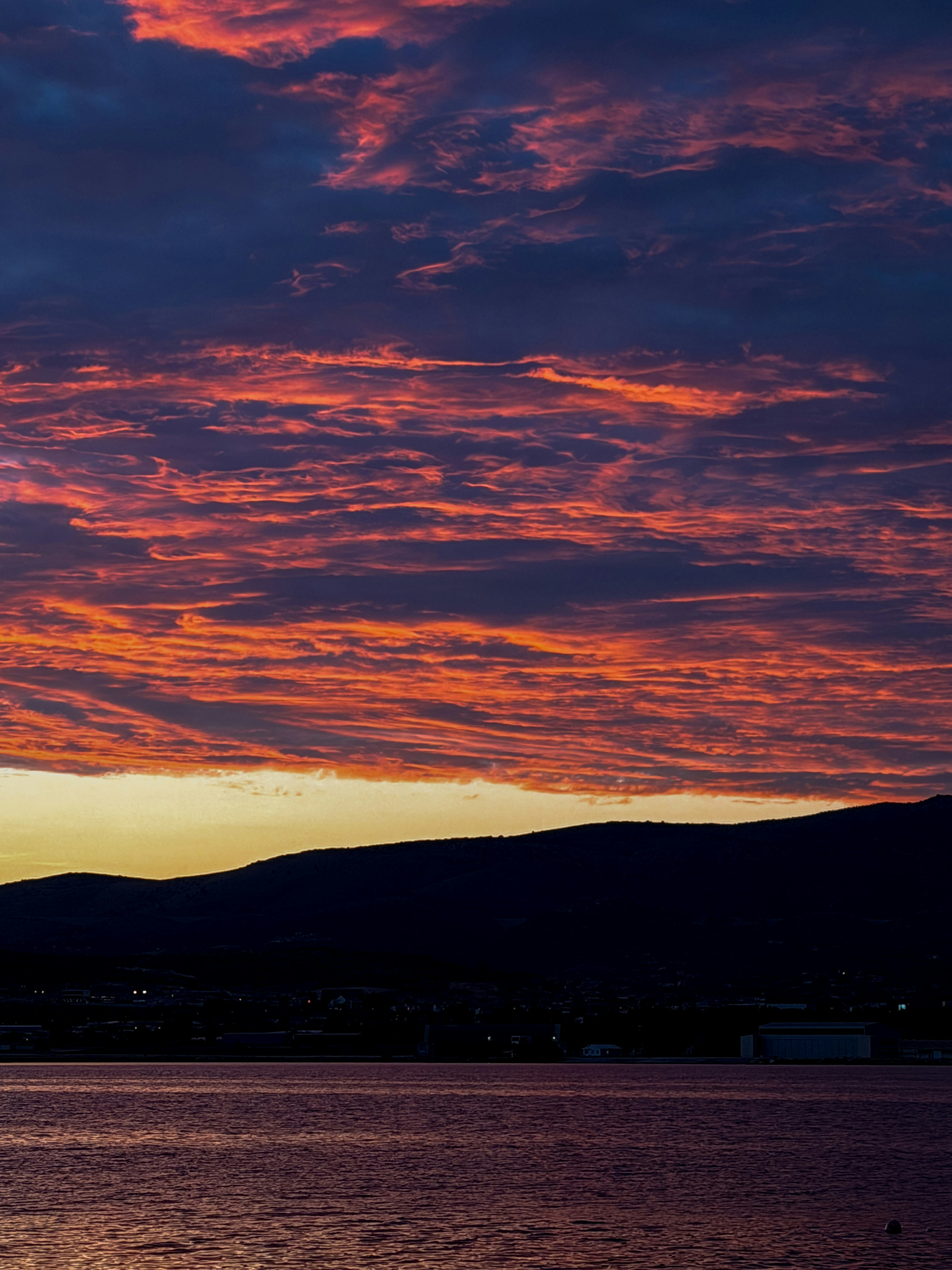 Crimson Sky Over Silent Waters