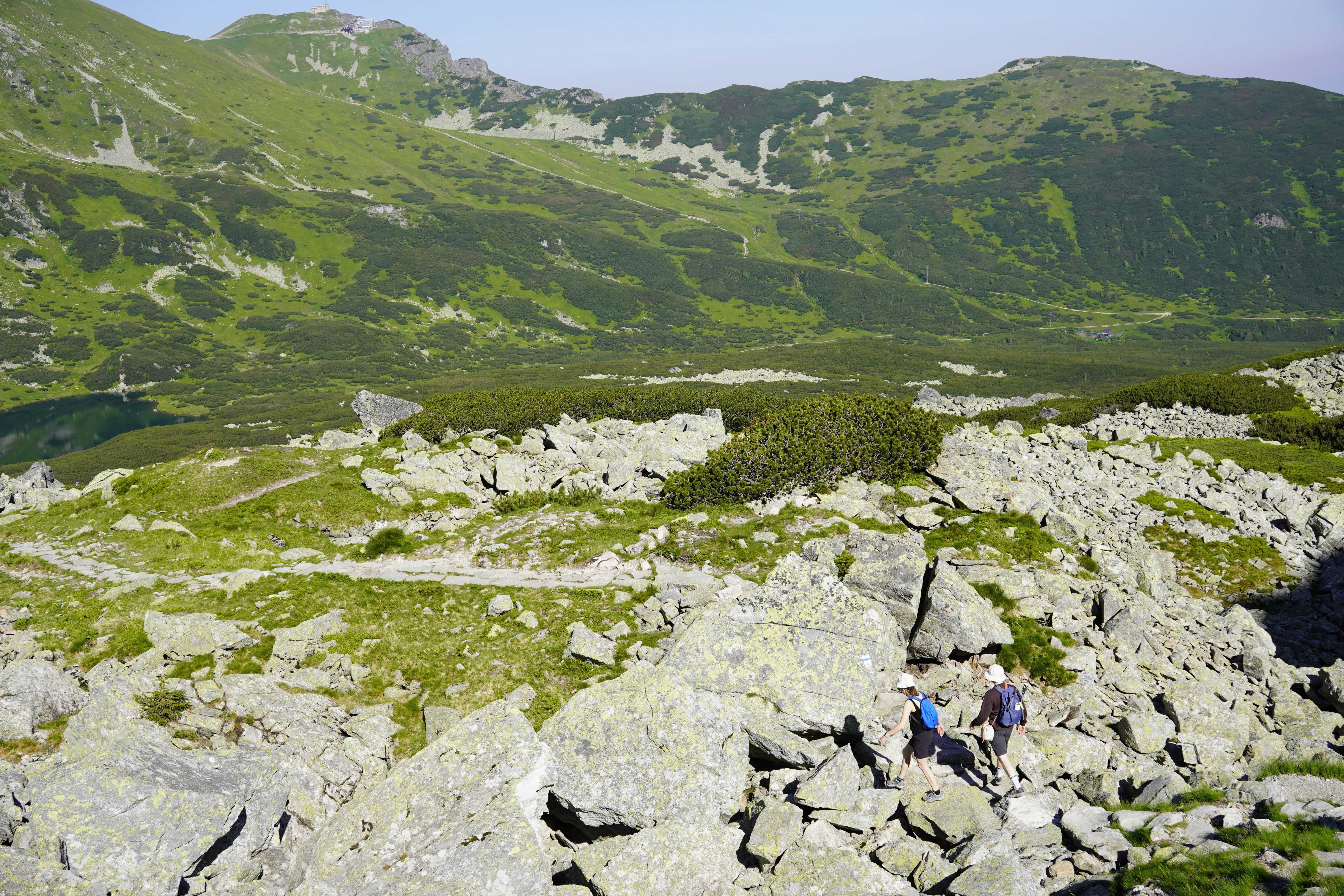Ridge Ascent: Climbers Conquer the Rocky Highland