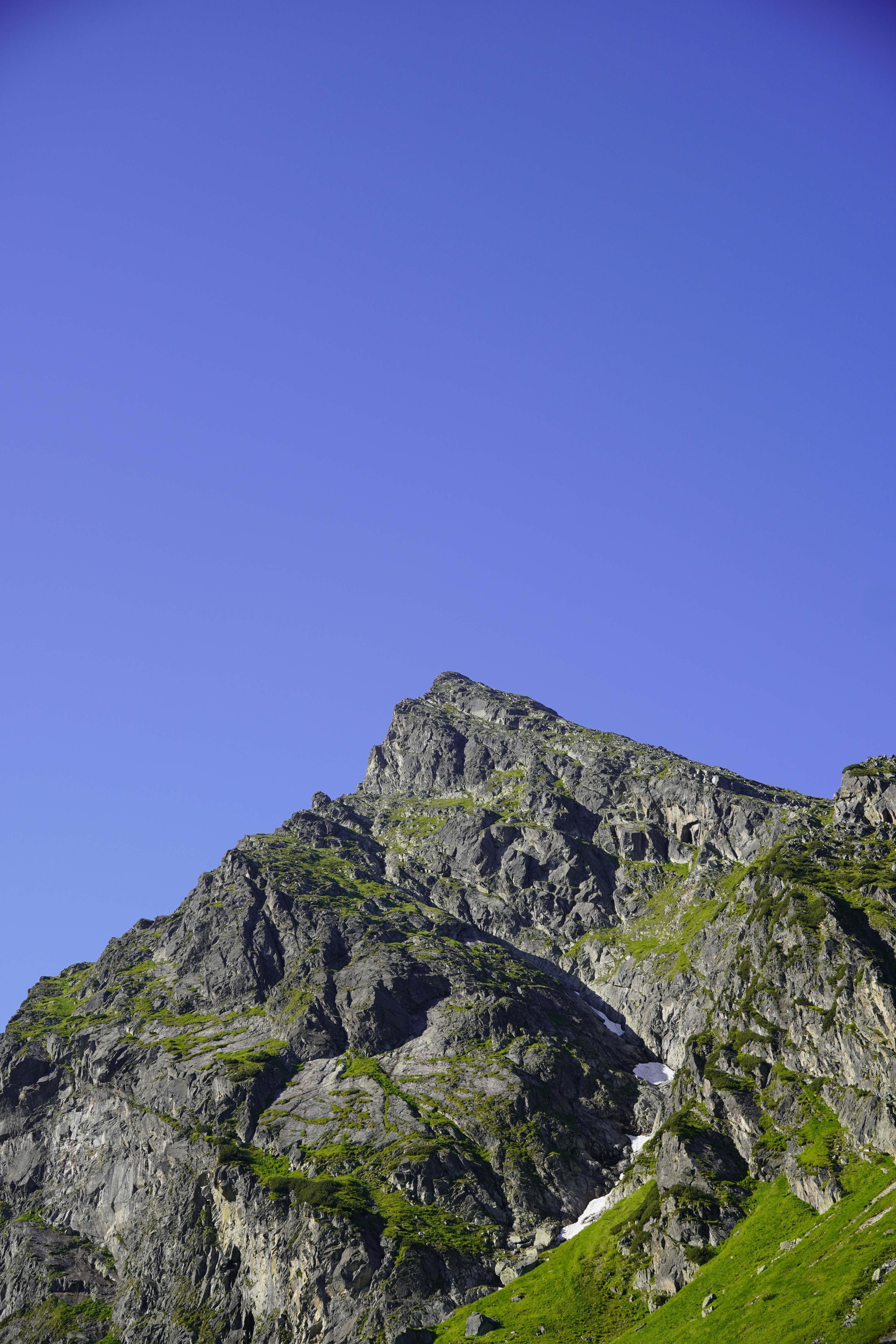 Rugged Peak Under a Clear Blue Dome