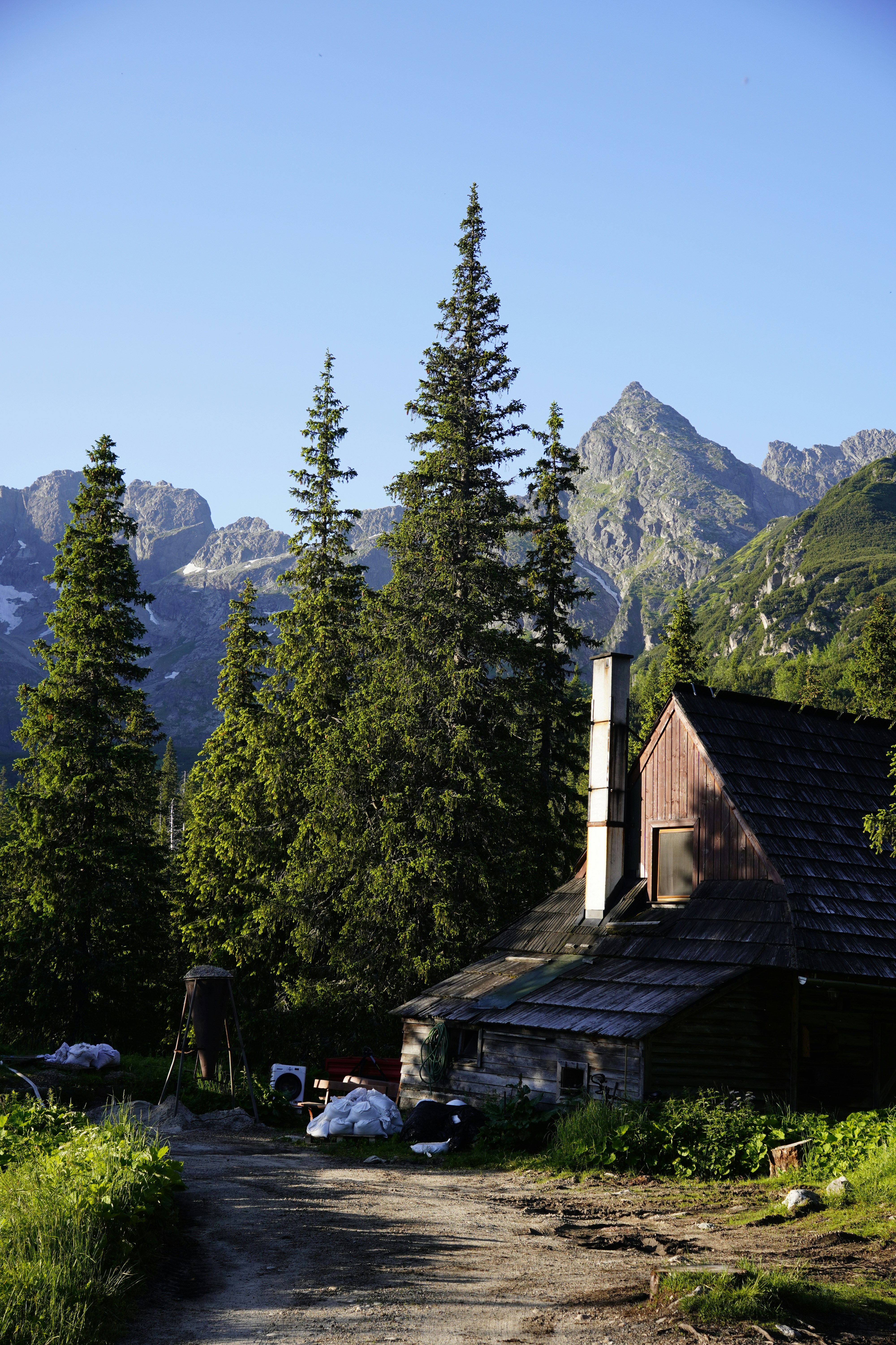 Alpine Refuge Under Clear Blue Skies