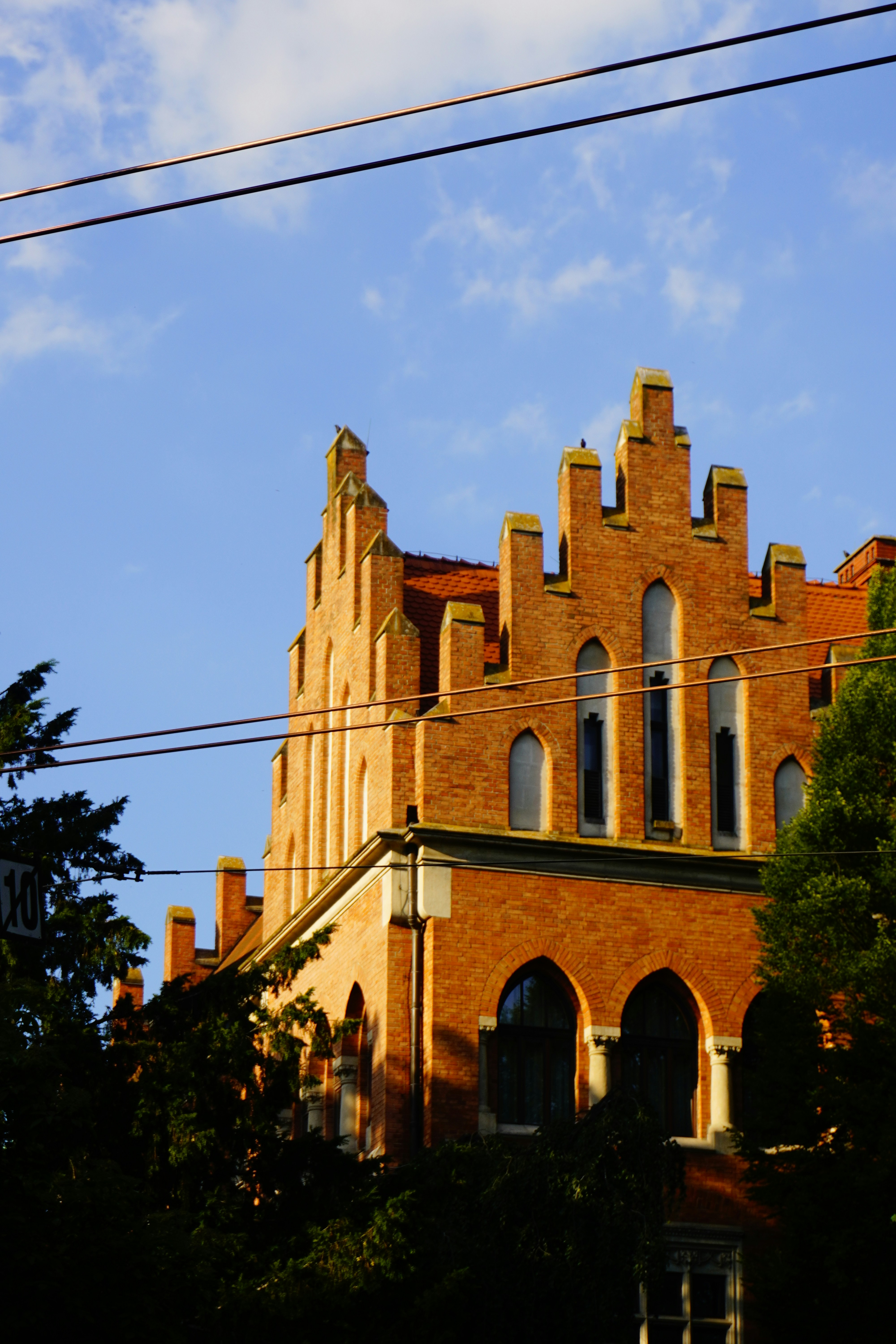 Brick Gothic Facade Reaching Toward a Clear Sky