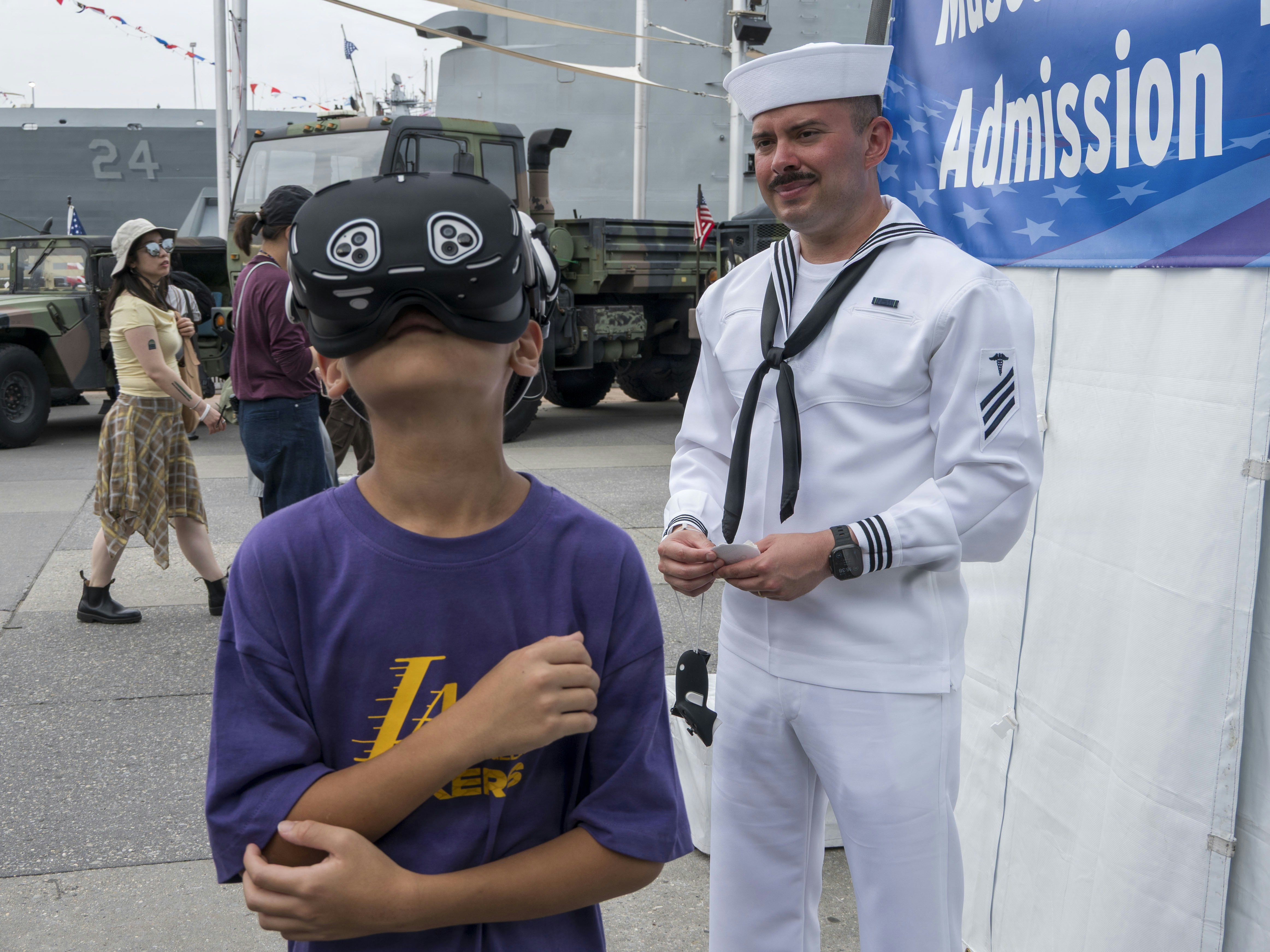 Virtual Pilot at the Parade: A Child in a VR Headset Front and Center