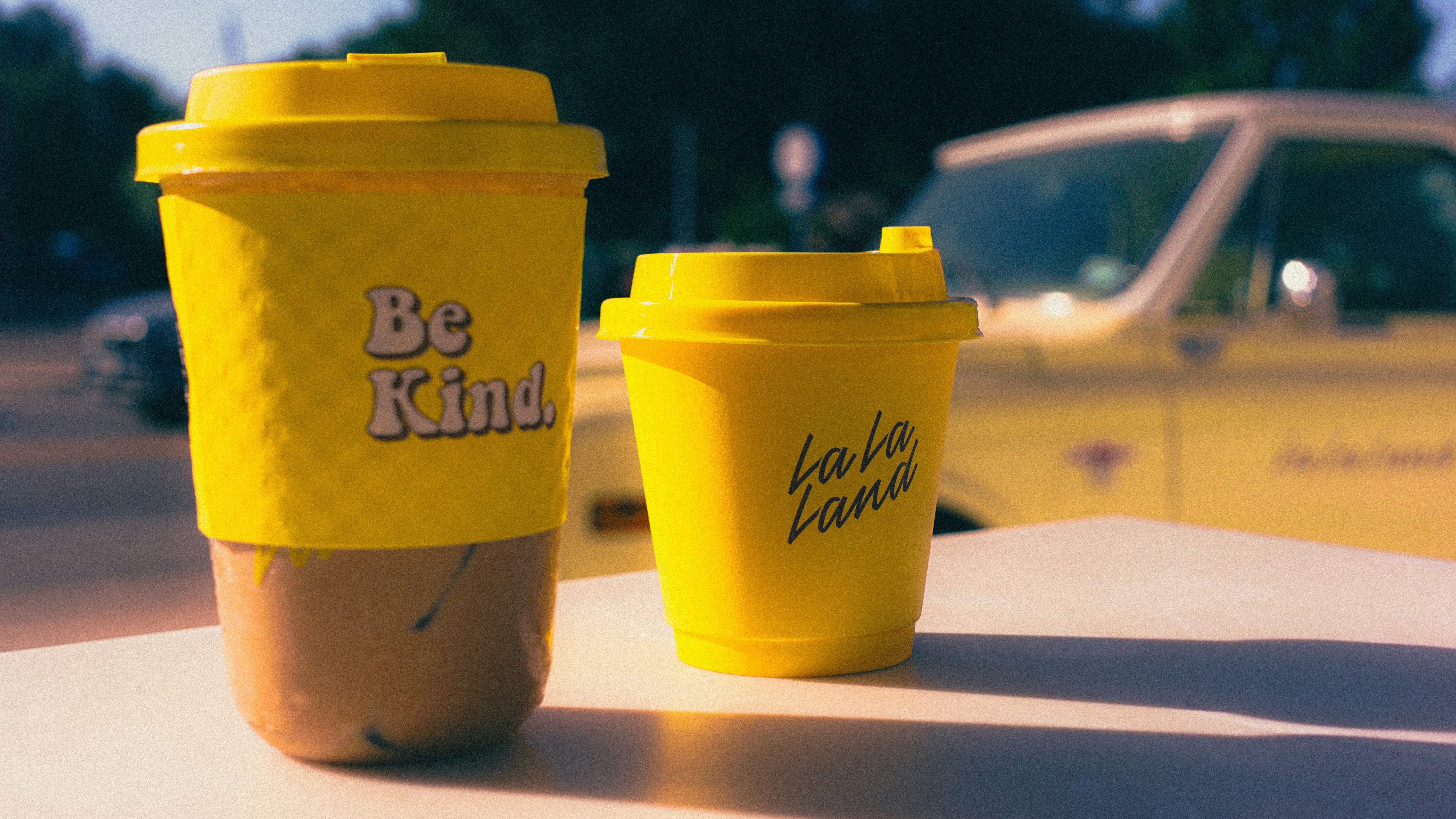 Yellow Cups on a Sunny Street