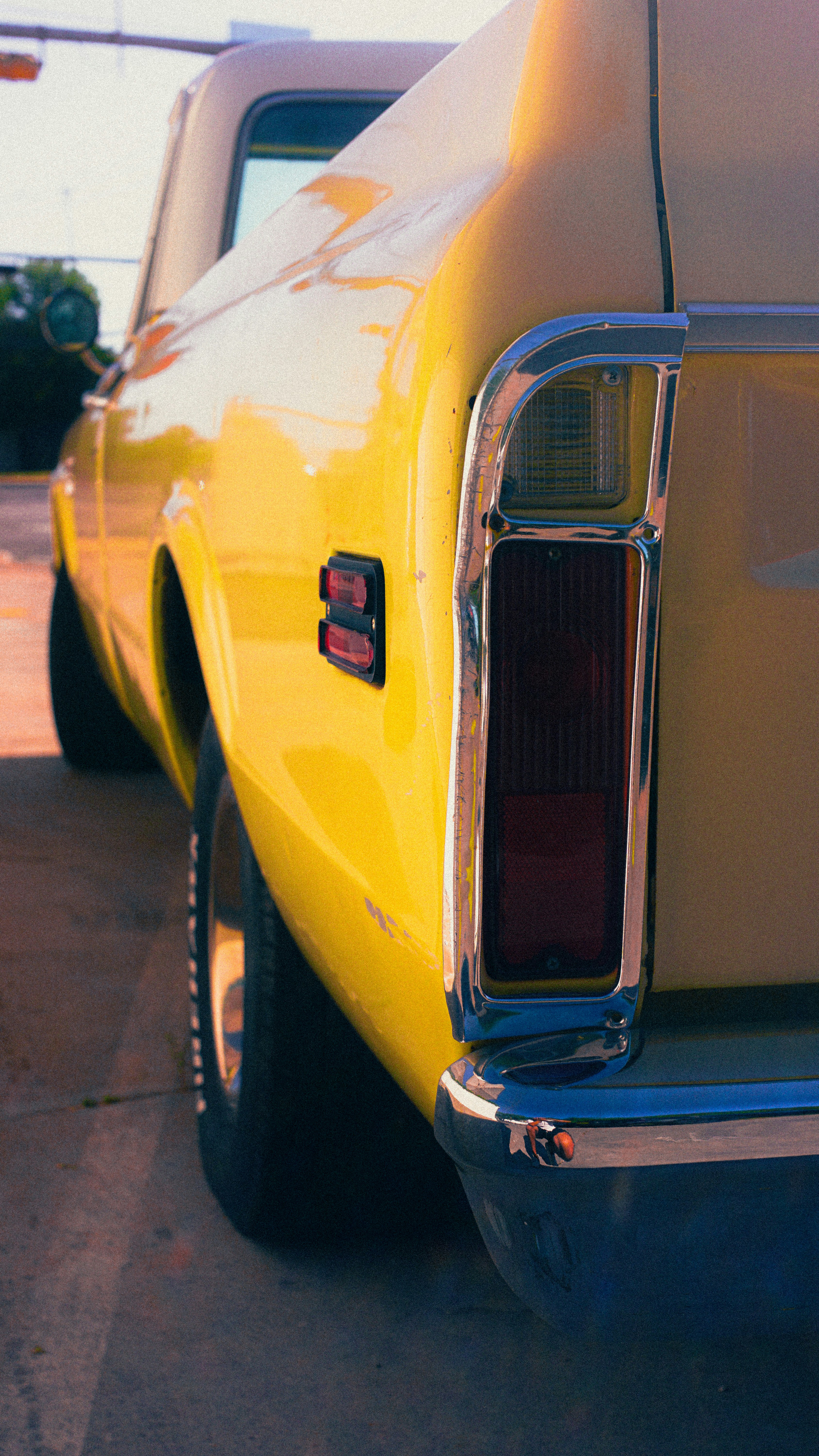 Sunlit Yellow Pickup: Chrome Trim, Tail Light Glow