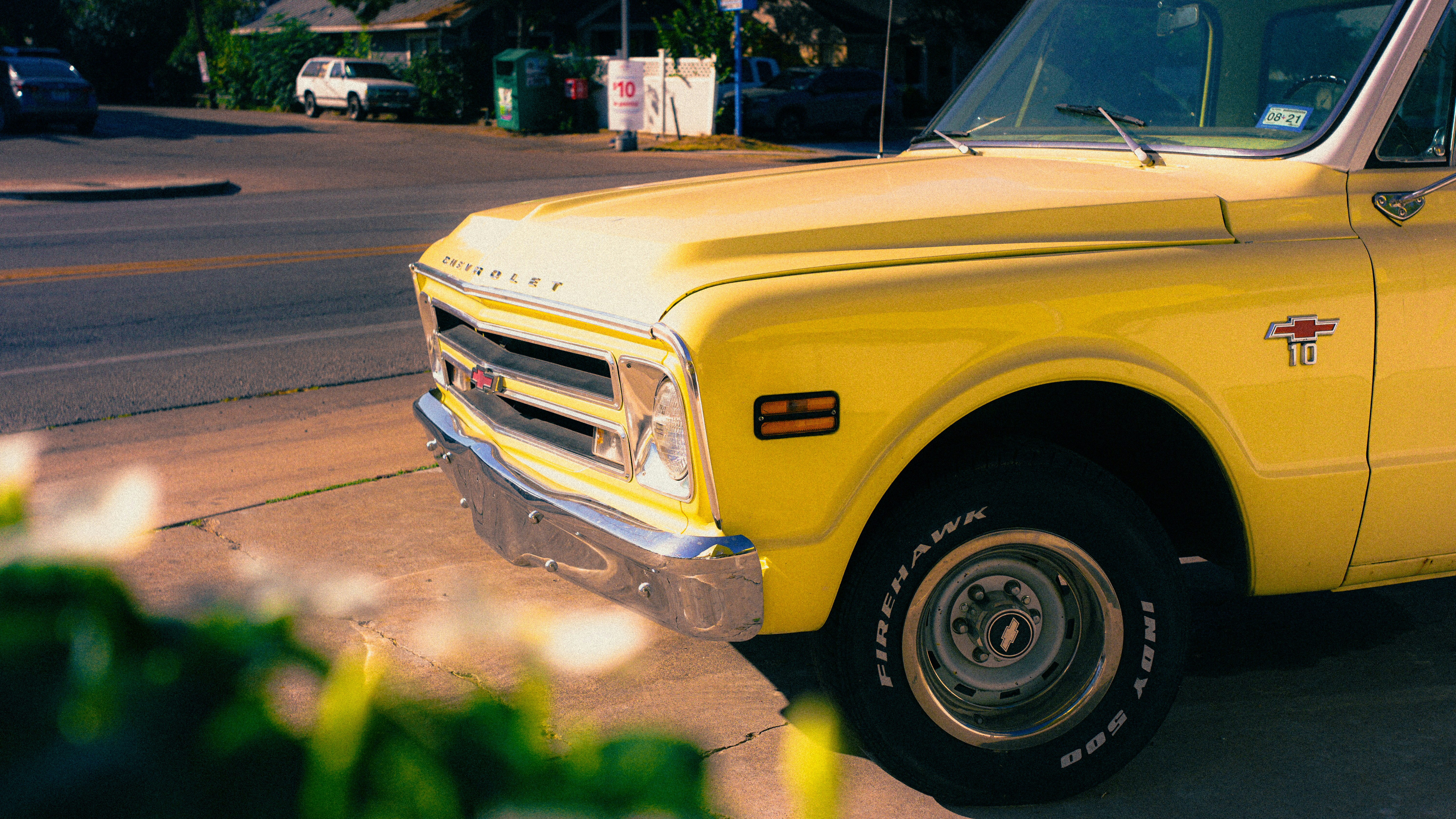 Sunlit Cheyenne: A Classic Yellow Pickup in Focus