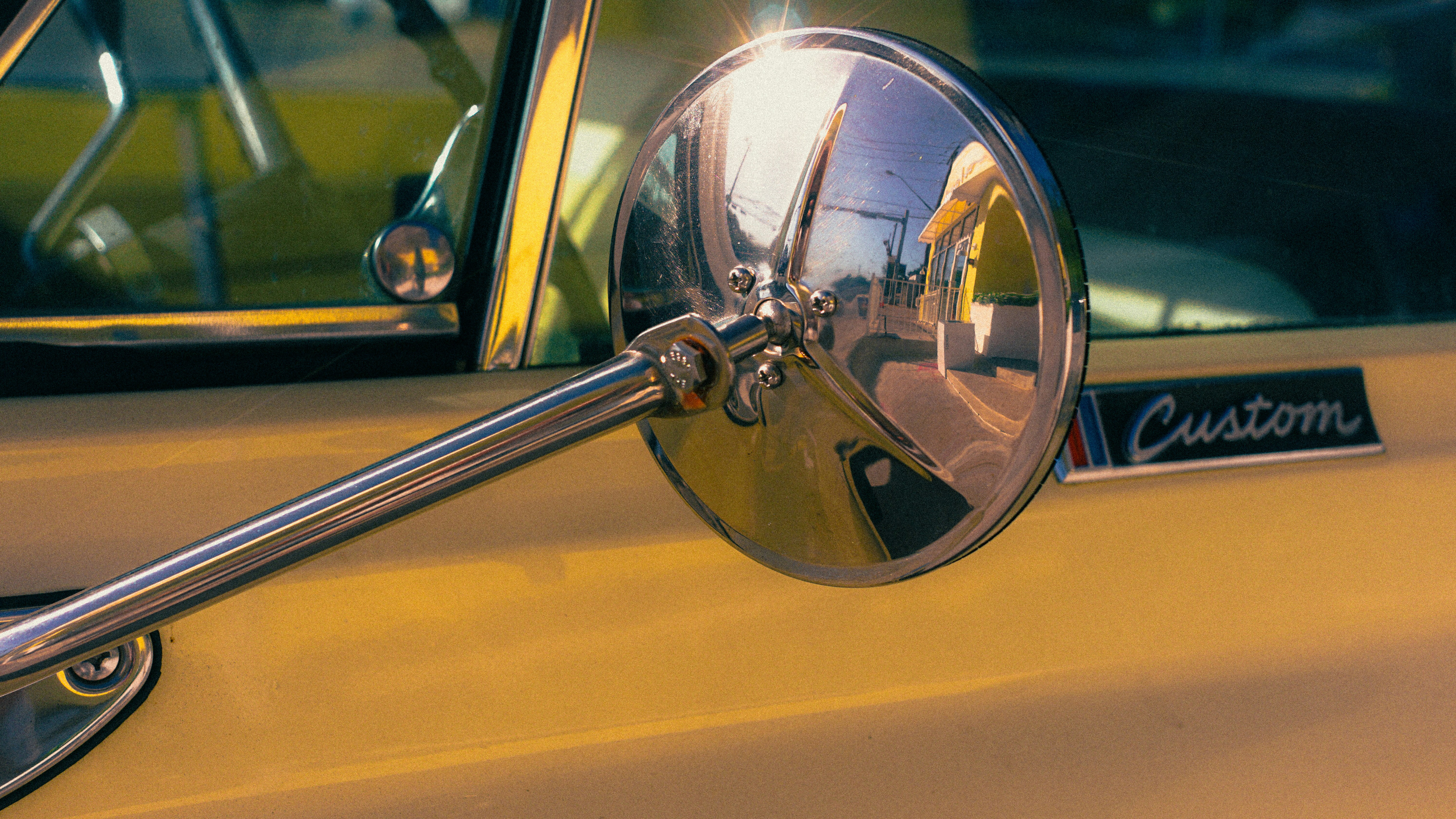 Chrome Mirror, Yellow Classic: Reflections of a Quiet Street