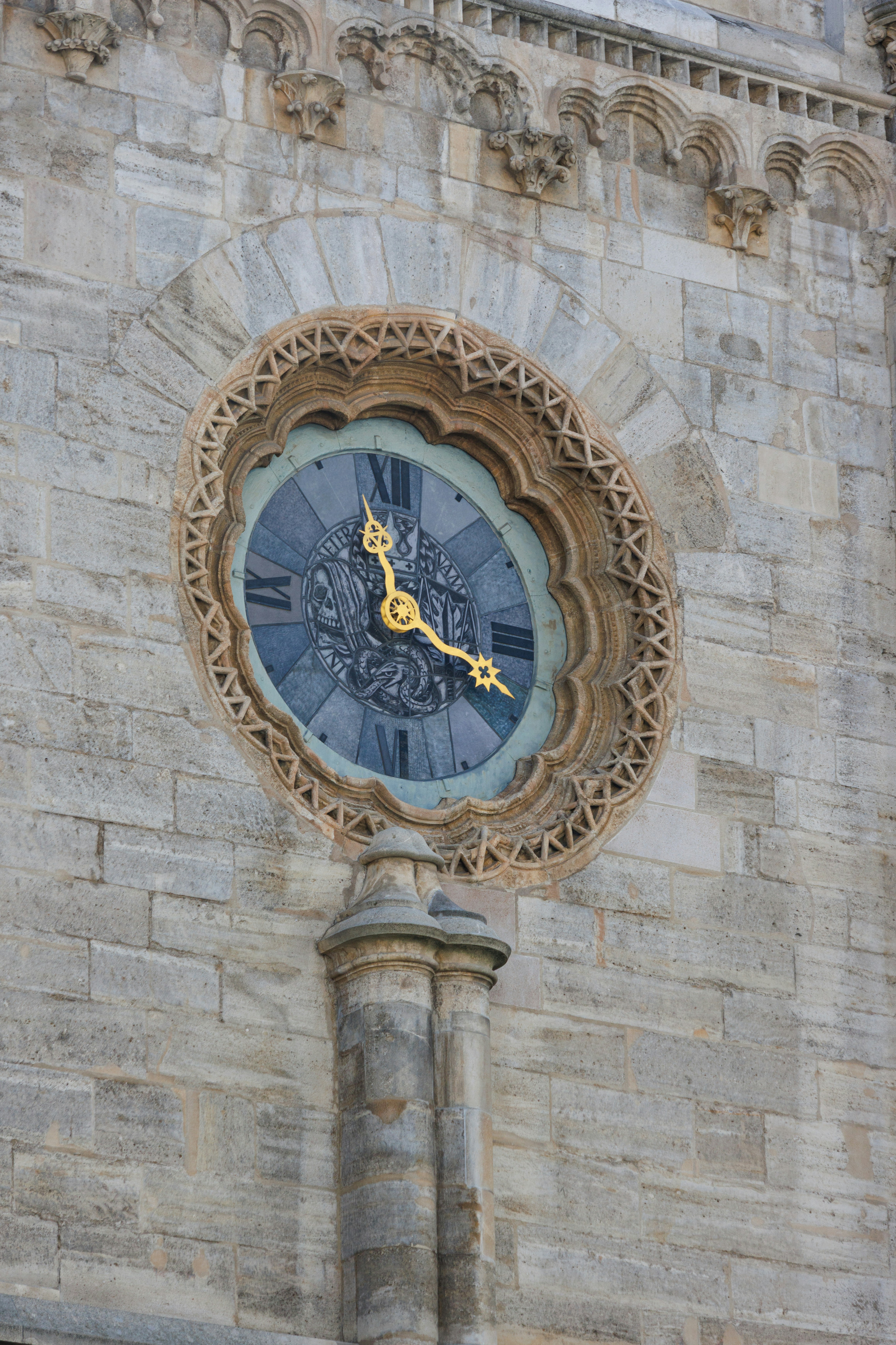 Golden Hands on Stone: An Ancient Clock Face