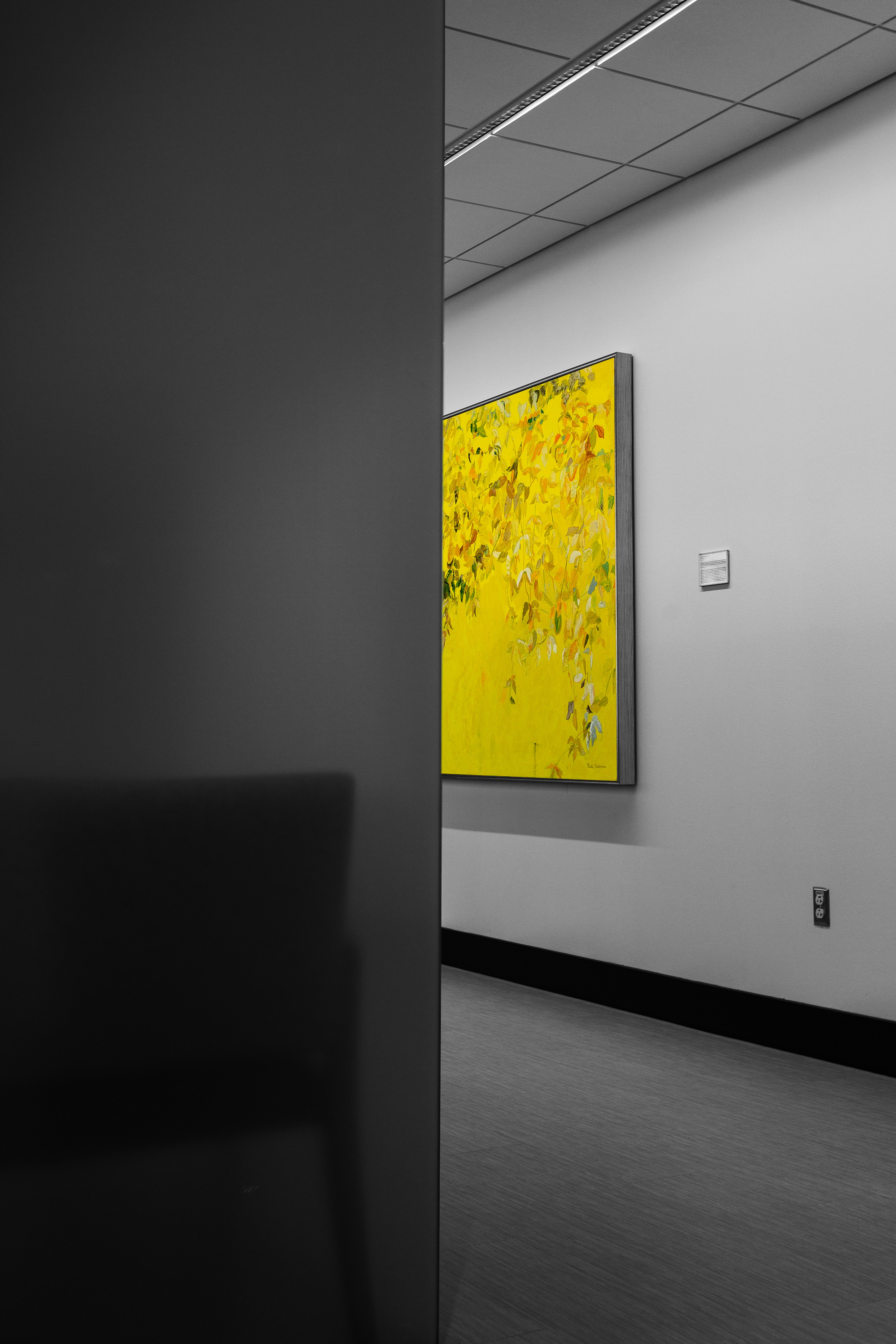 Yellow Painting in a Quiet Gallery Nook