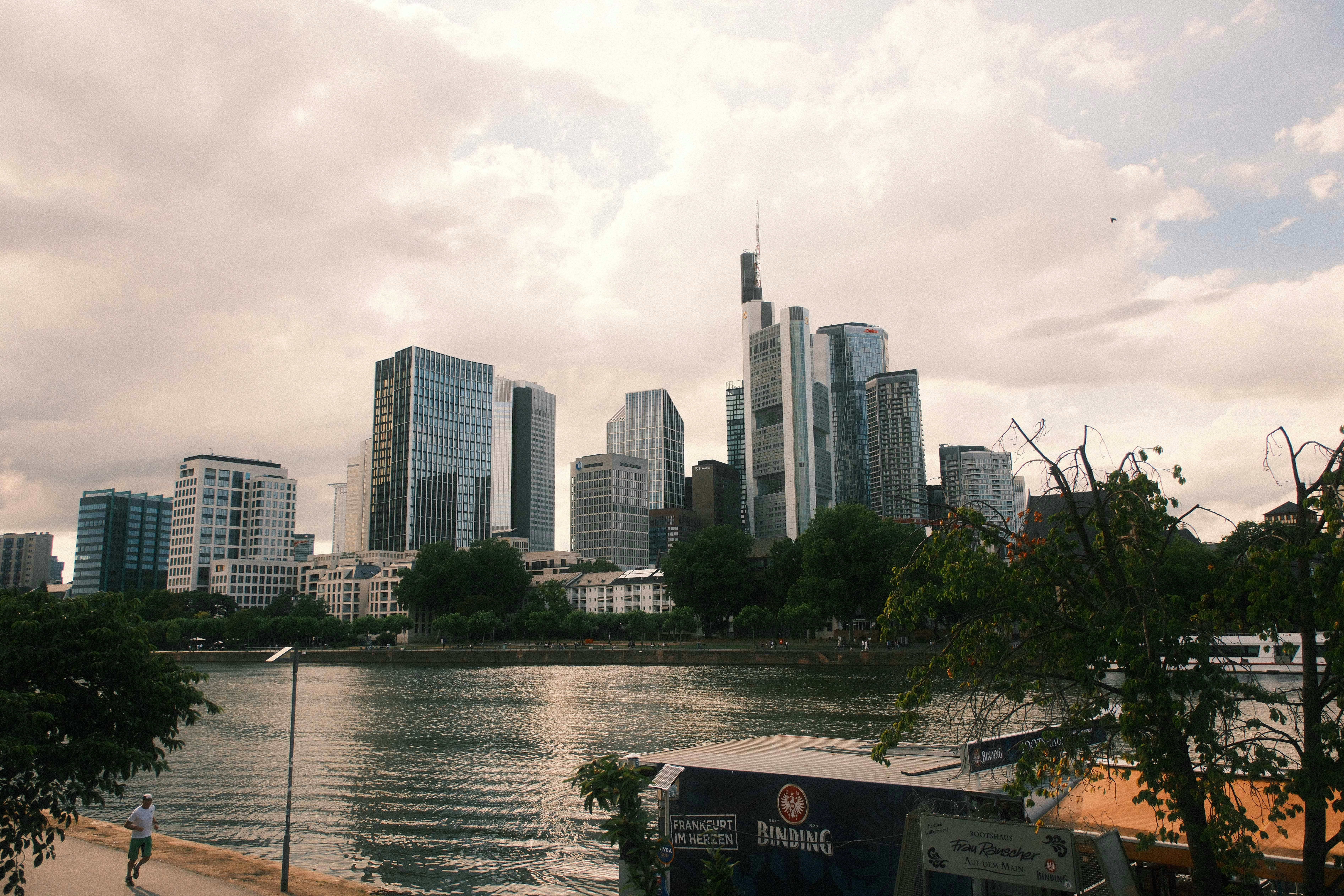 Urban Reflections: A Riverside Skyline at Dusk