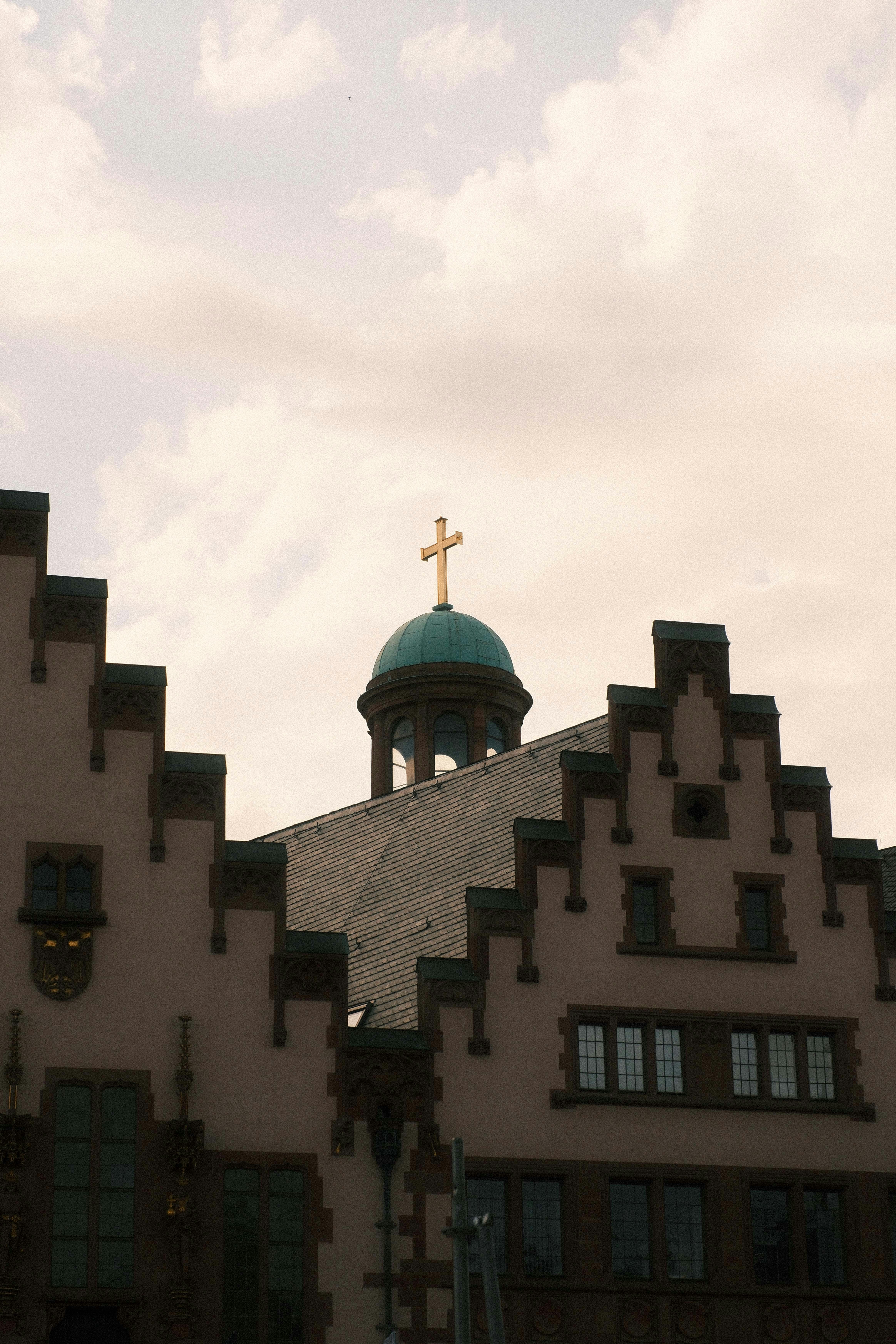 Cross and Dome Crown the City-Gothic Rooftops