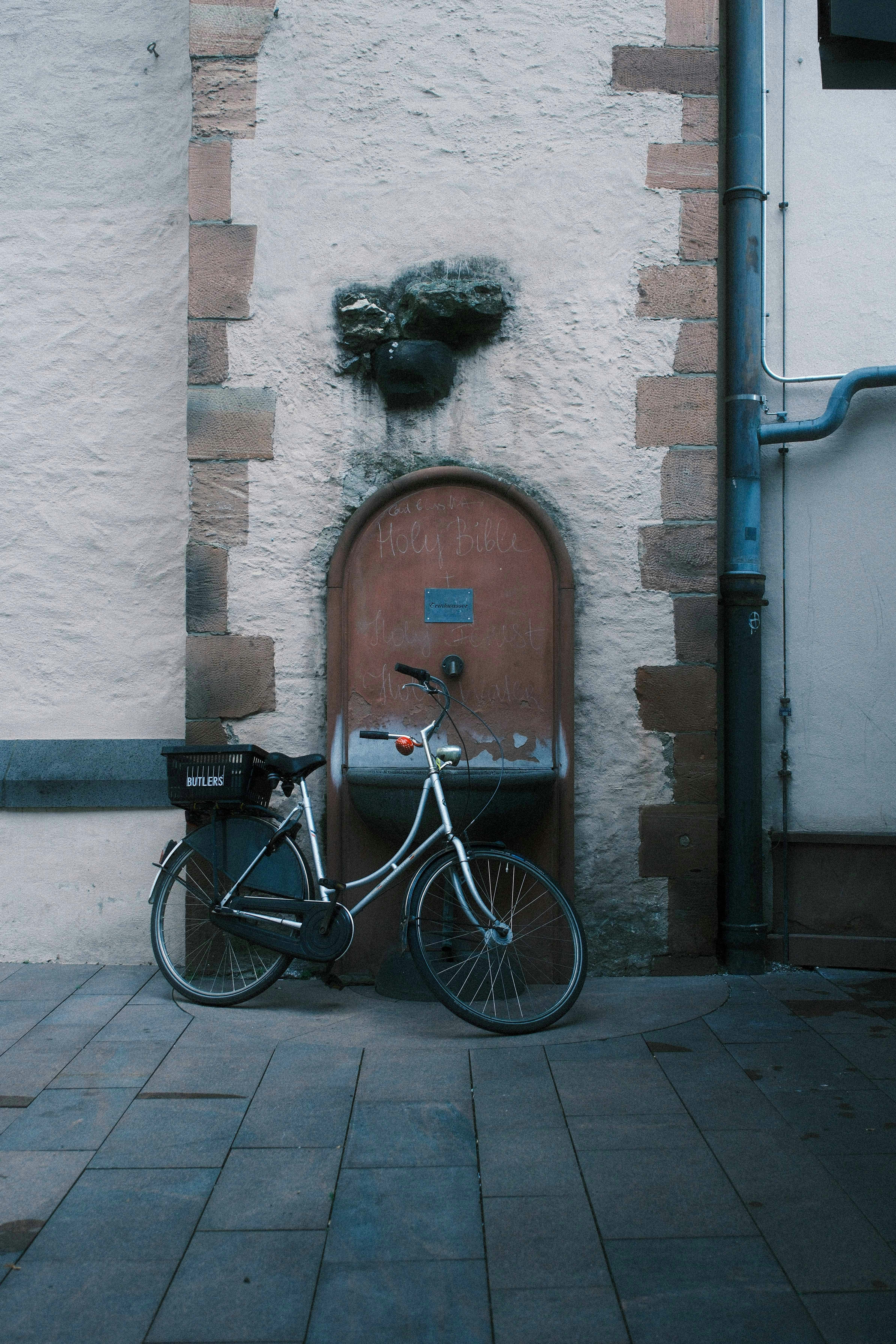 Street Bicycle at a Quiet Corner by a Weathered Door