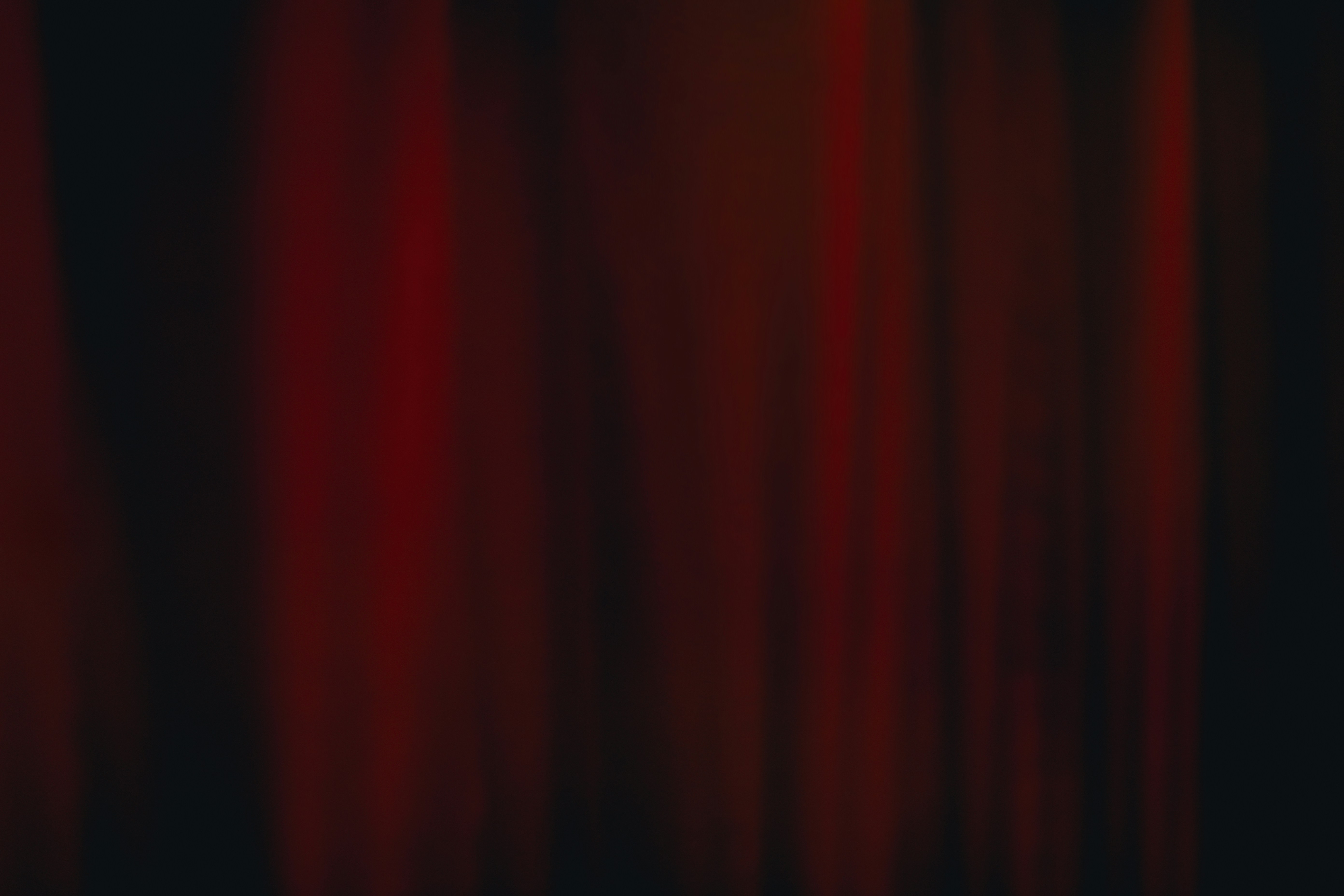 Crimson Veil: Subtle Streaks in Low Light