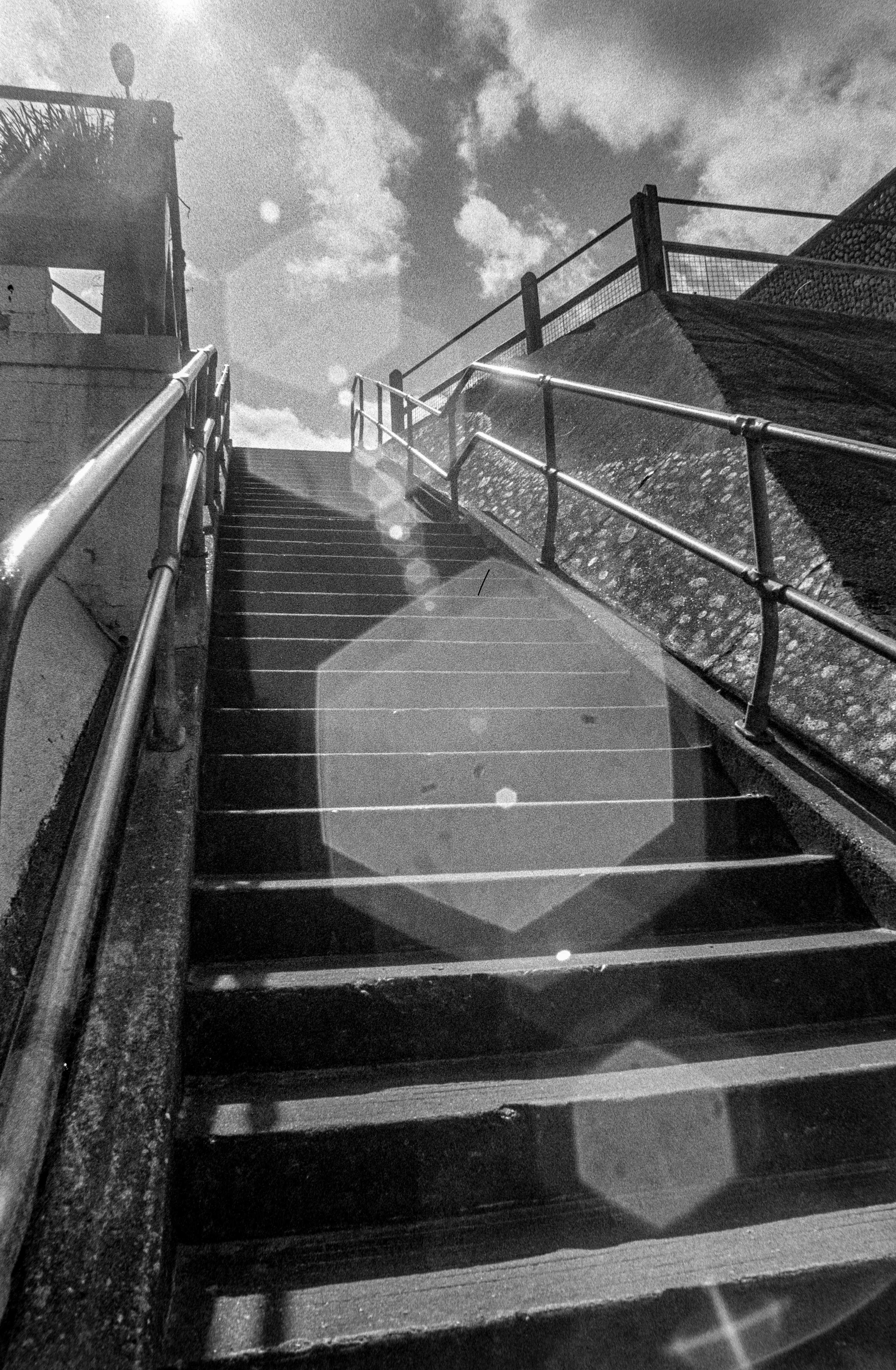Stairs up from the promenade at Sheringham. Fomapan 400 film.