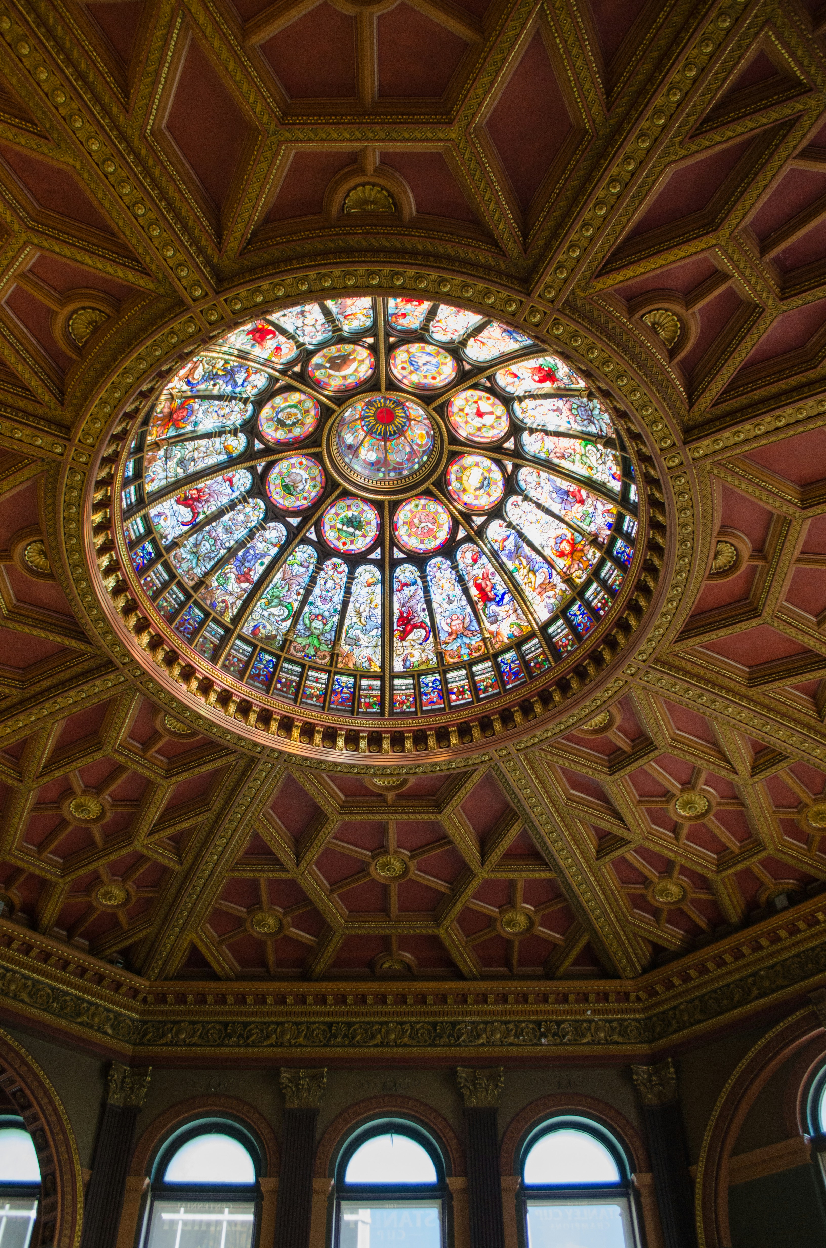 Stained Light: A Circular Rose Window Crowned by Vaulted Geometry
